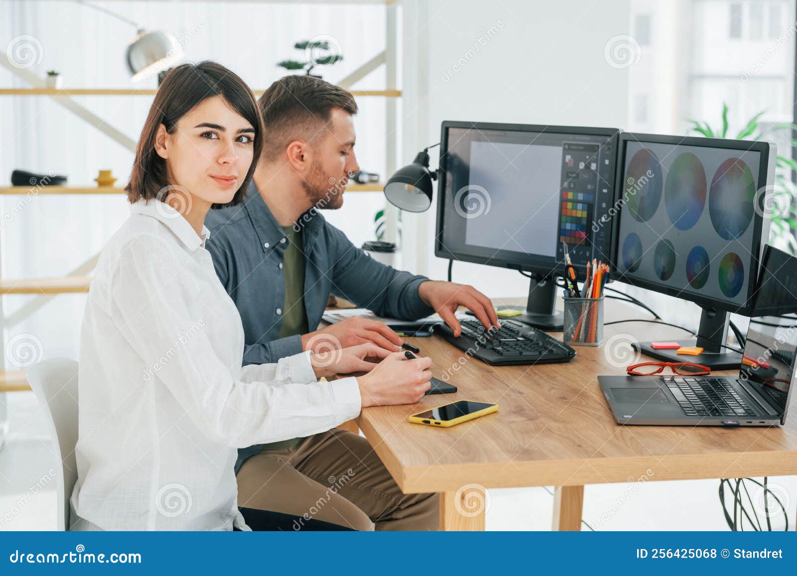 Talking with Each Other about New Ideas. Two Designers Working Together ...