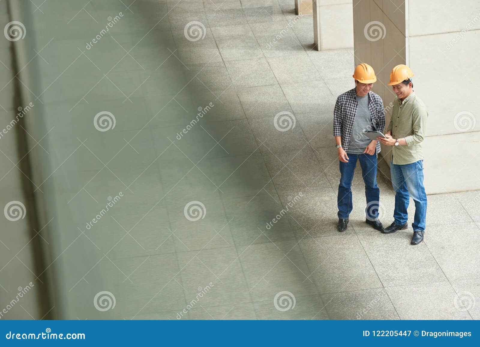 Talking engineers stock image. Image of working, discussing - 122205447