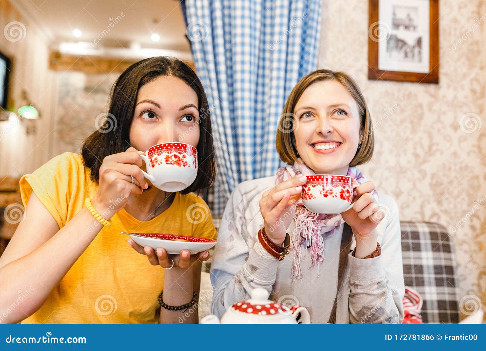 Talking and Laughing while Having Cup of Tea Stock Photo - Image of ...