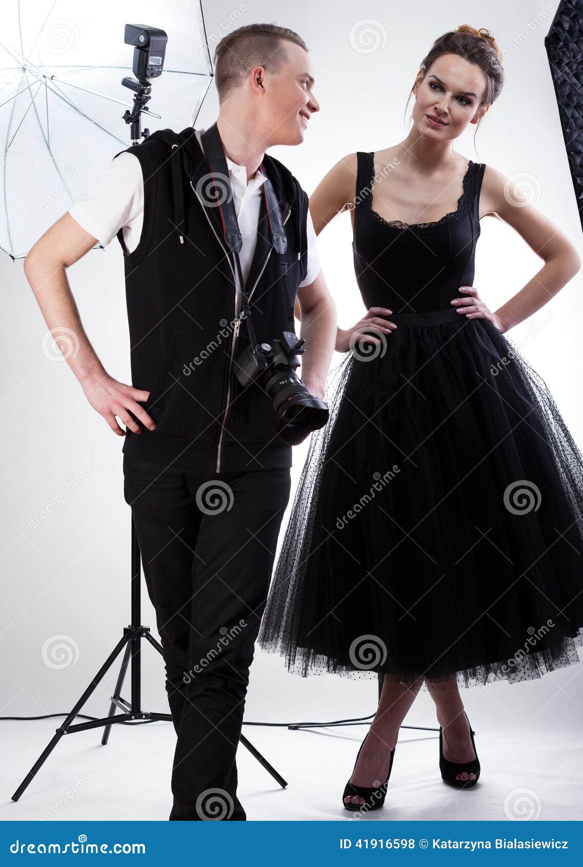 Talking about Photo Session Stock Photo - Image of light, black: 41916598