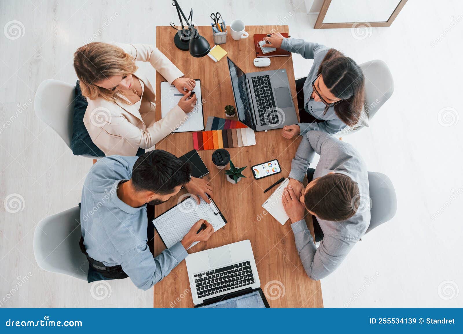 Talking about Project. Group of Business People that Working in the ...