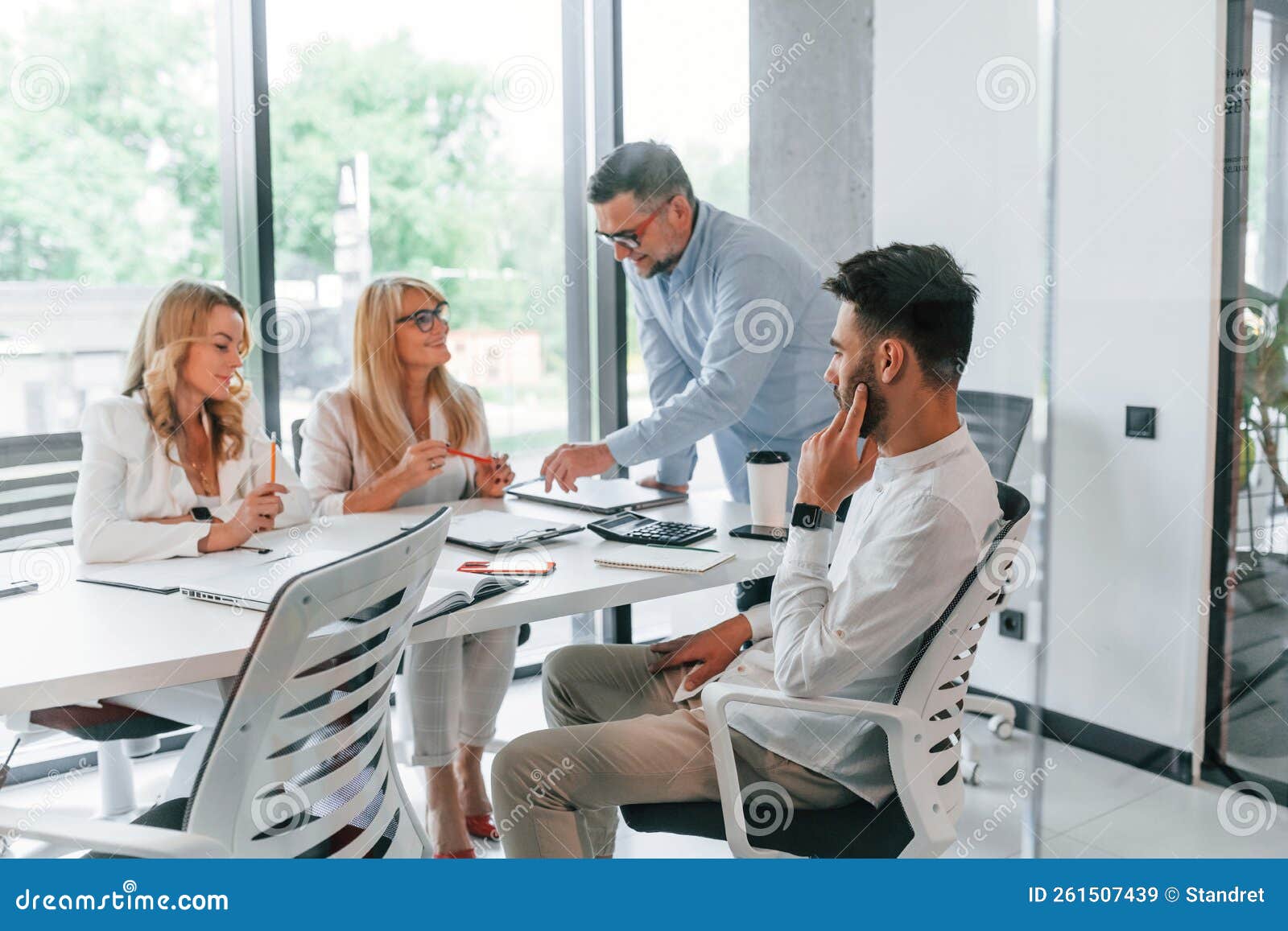 Talking and Working on the Project Together. Group of Professional ...