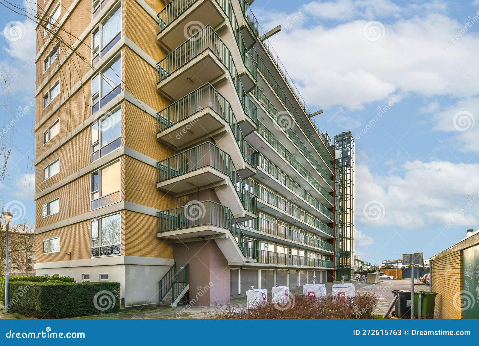 A Tall Apartment Building with Balconies on the Outside Stock Image ...