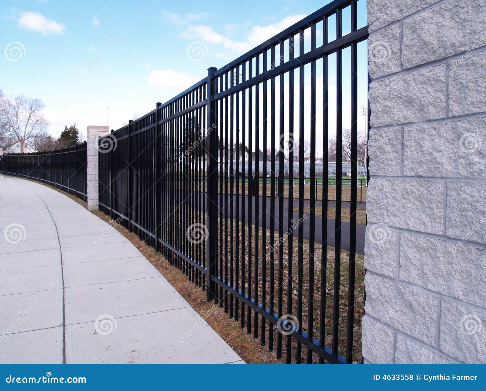 Tall black fence stock photo. Image of curving, concrete - 4633558