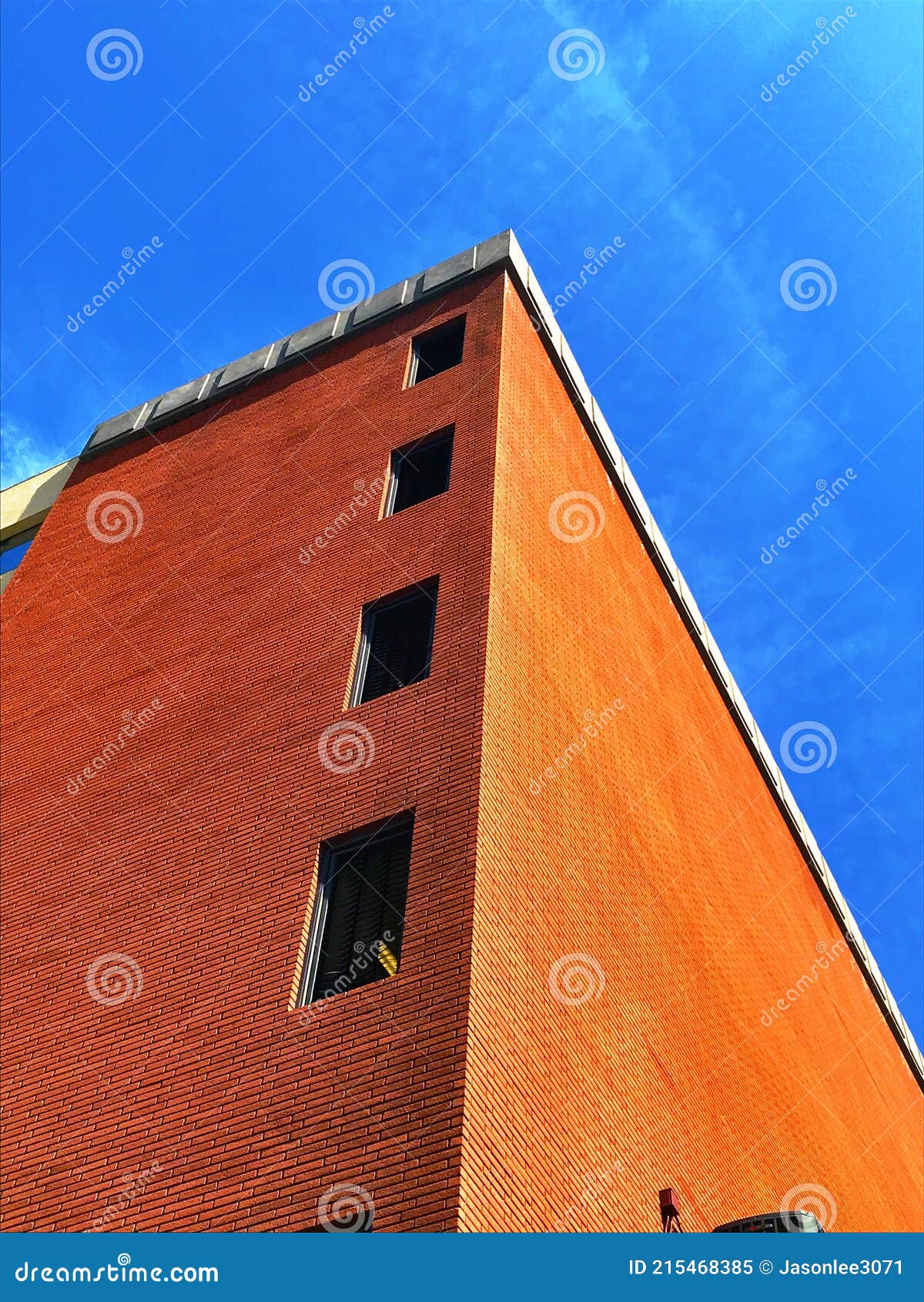 Tall brick building stock image. Image of urban, lowangleview - 215468385 Tall brick building stock image. Image of urban, lowangleview - 215468385