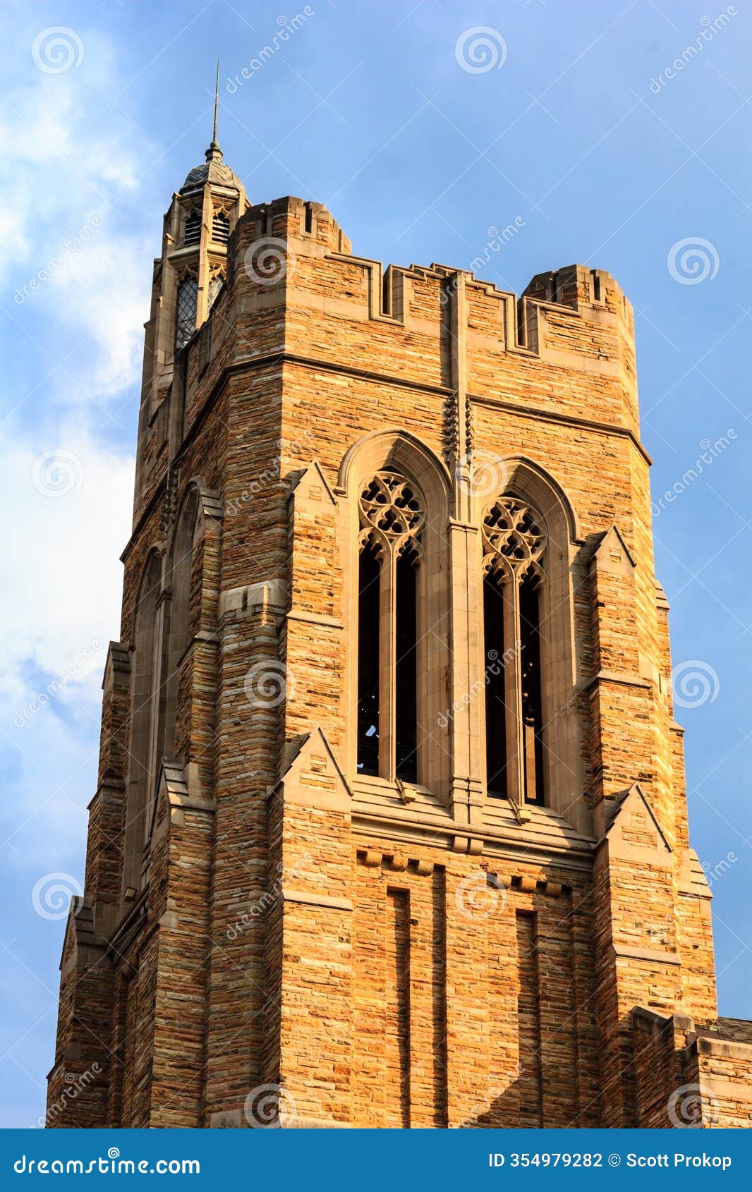 A Tall Brick Tower With A Pointed Roof Stock Photography ...