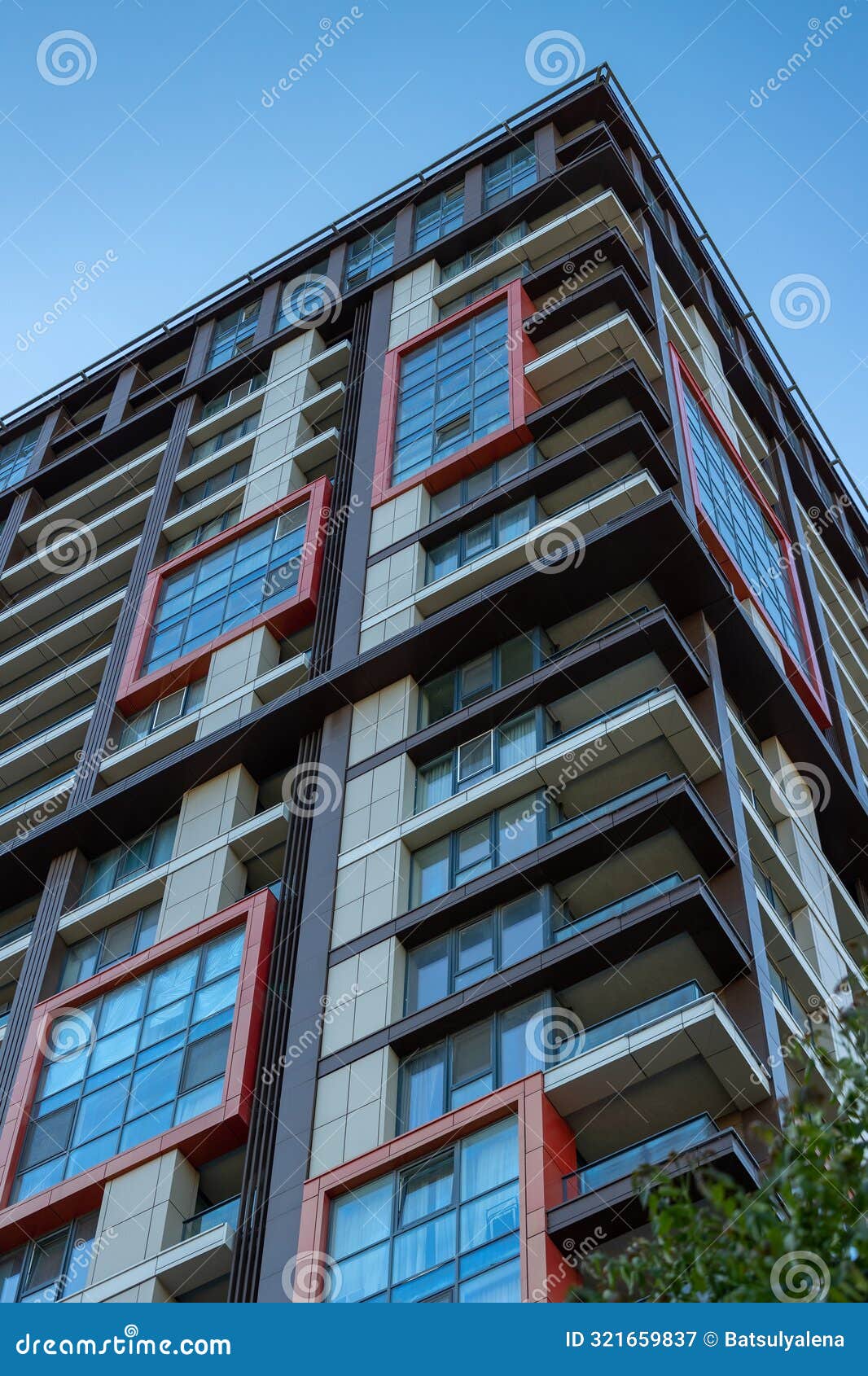 A Tall Building with a Bright Facade Stock Image - Image of apartment ...