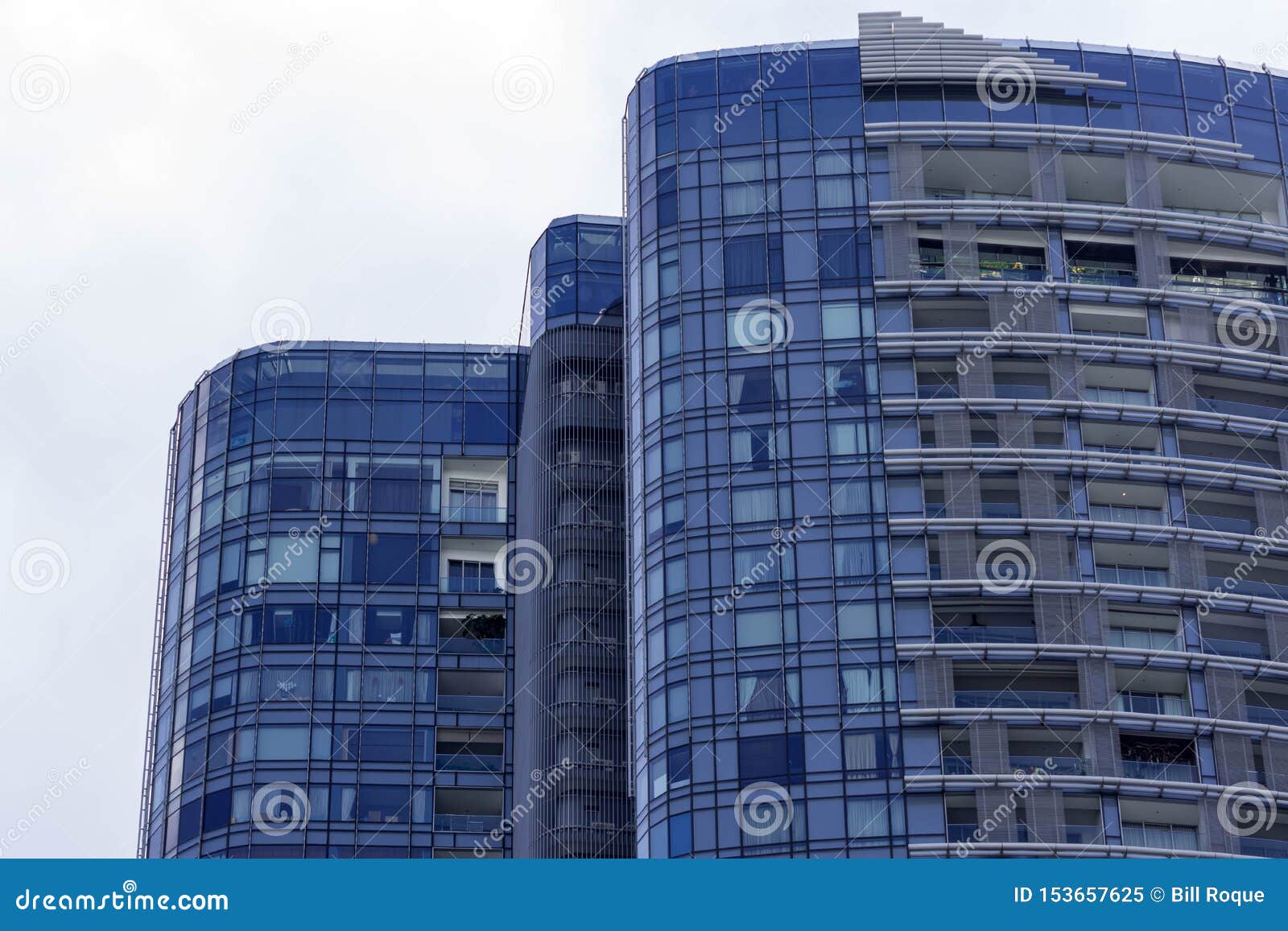 Tall Building Facade Windows Front View. Green Windows Facade of a Tall ...