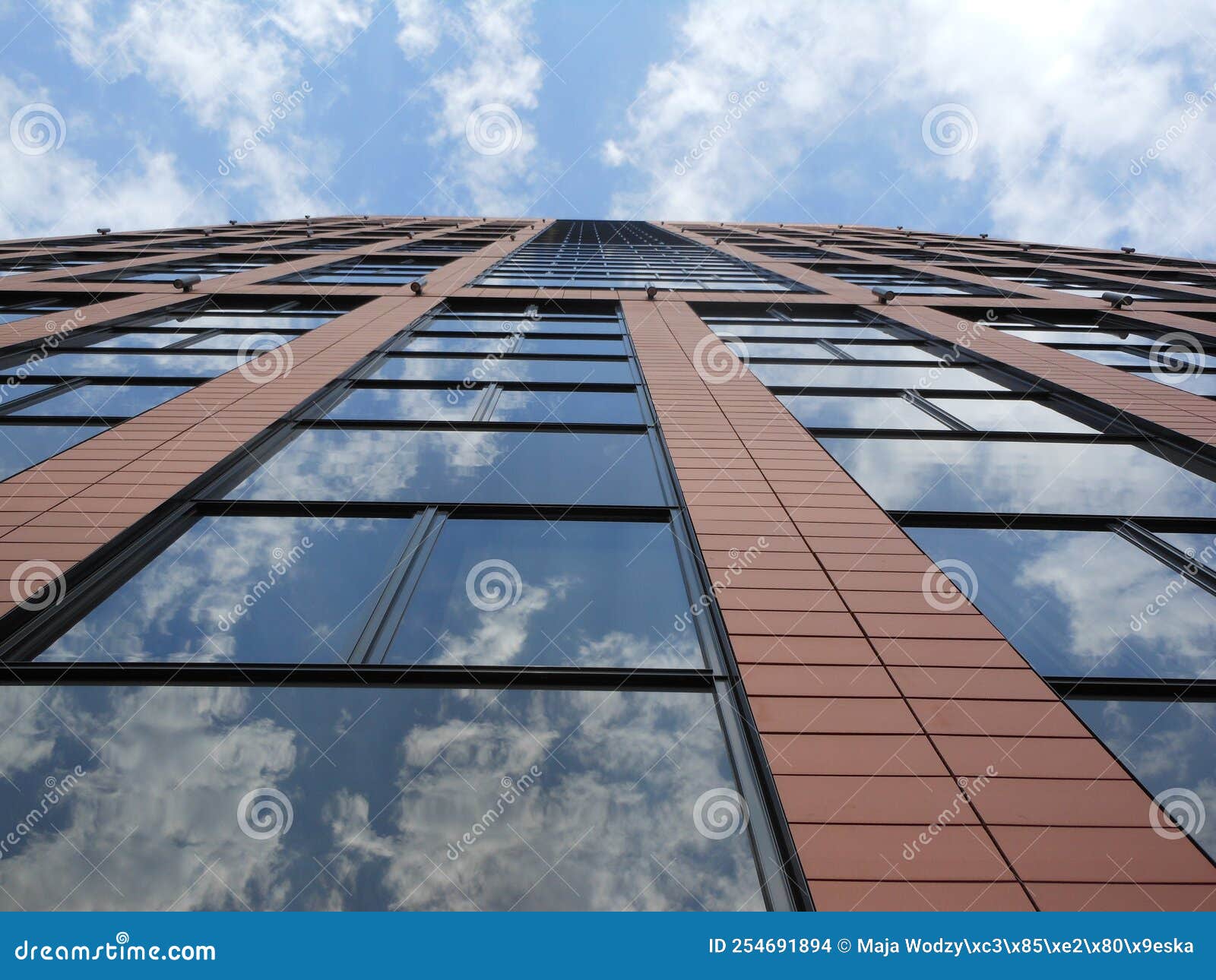 Red Brick Building with Reflective Windows Stock Photo - Image of ...