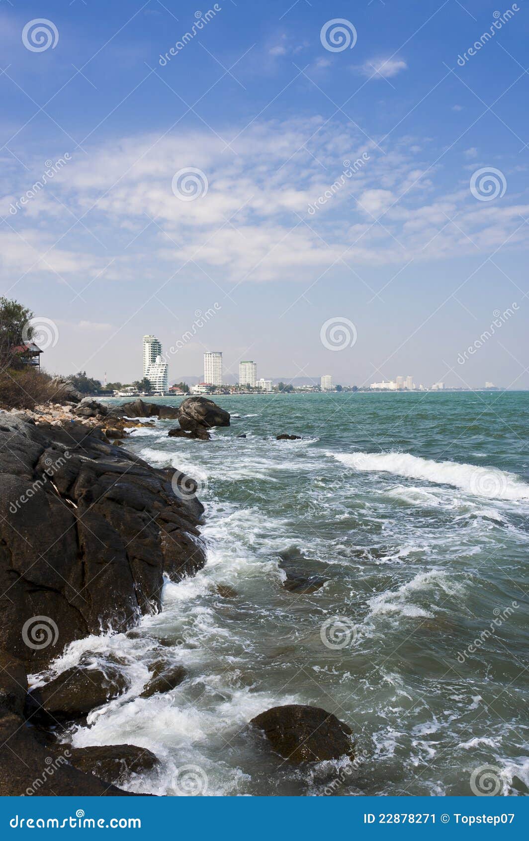 Tall Building Near the Beach Stock Image - Image of rock, wave: 22878271
