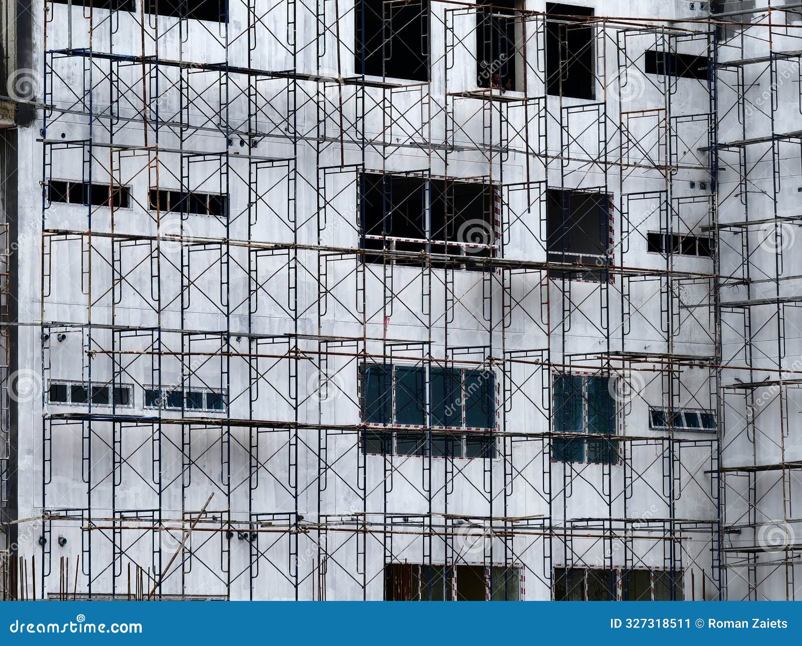 A Tall Building with Numerous Windows is Being Built Stock Image ...