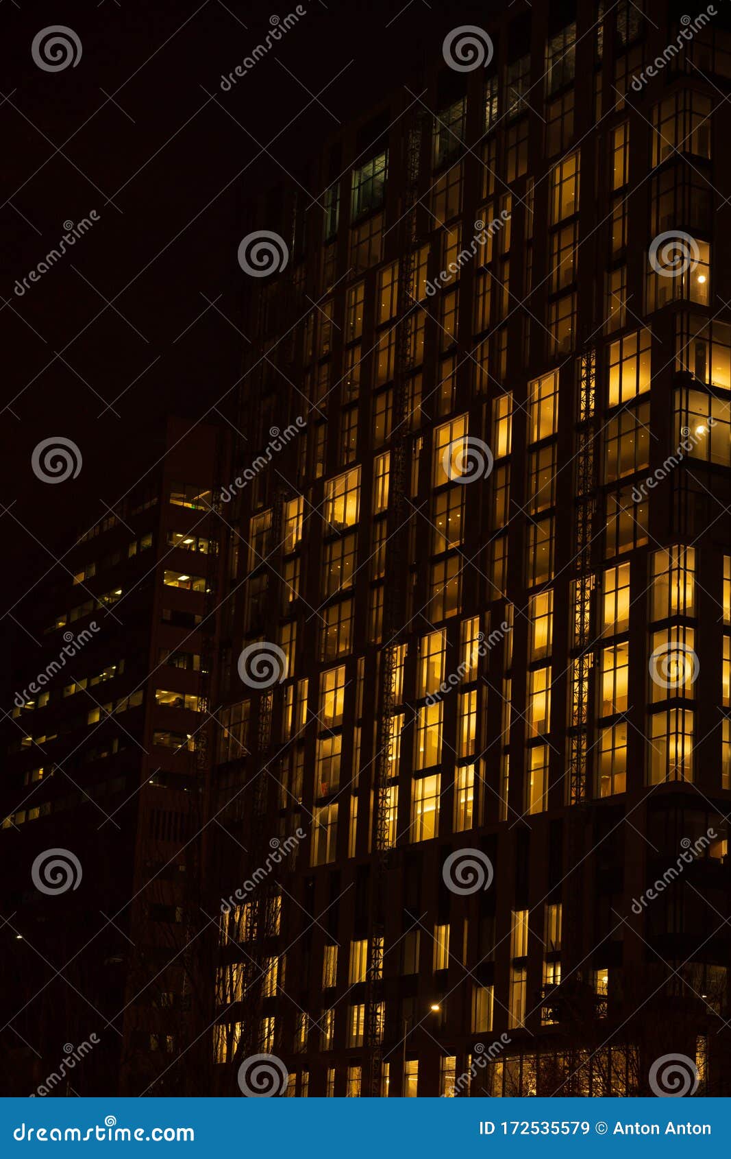 Tall Building, Skyscraper, at Night, People at Work at the Office ...