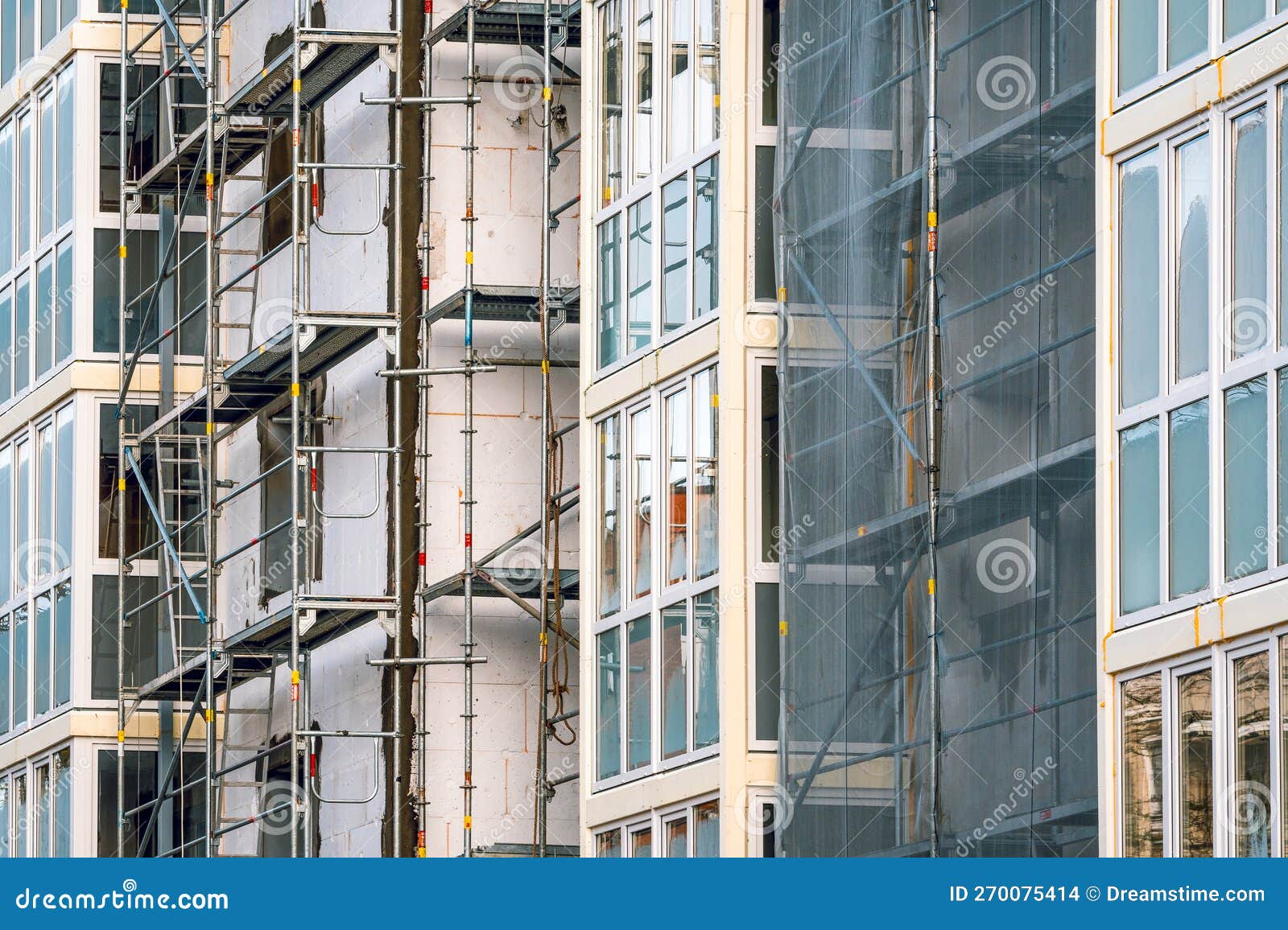 Scaffolding On A Multistory Building. Warming Of The Outer Wall Panel ...