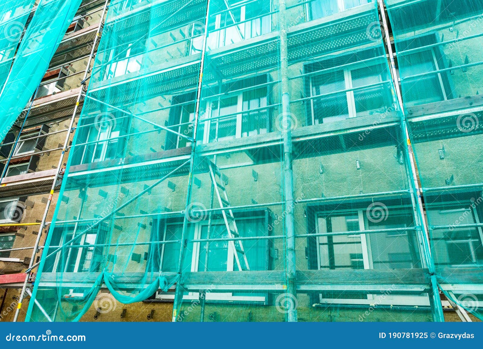 Tall Building Under Construction with Scaffolds Stock Image - Image of ...