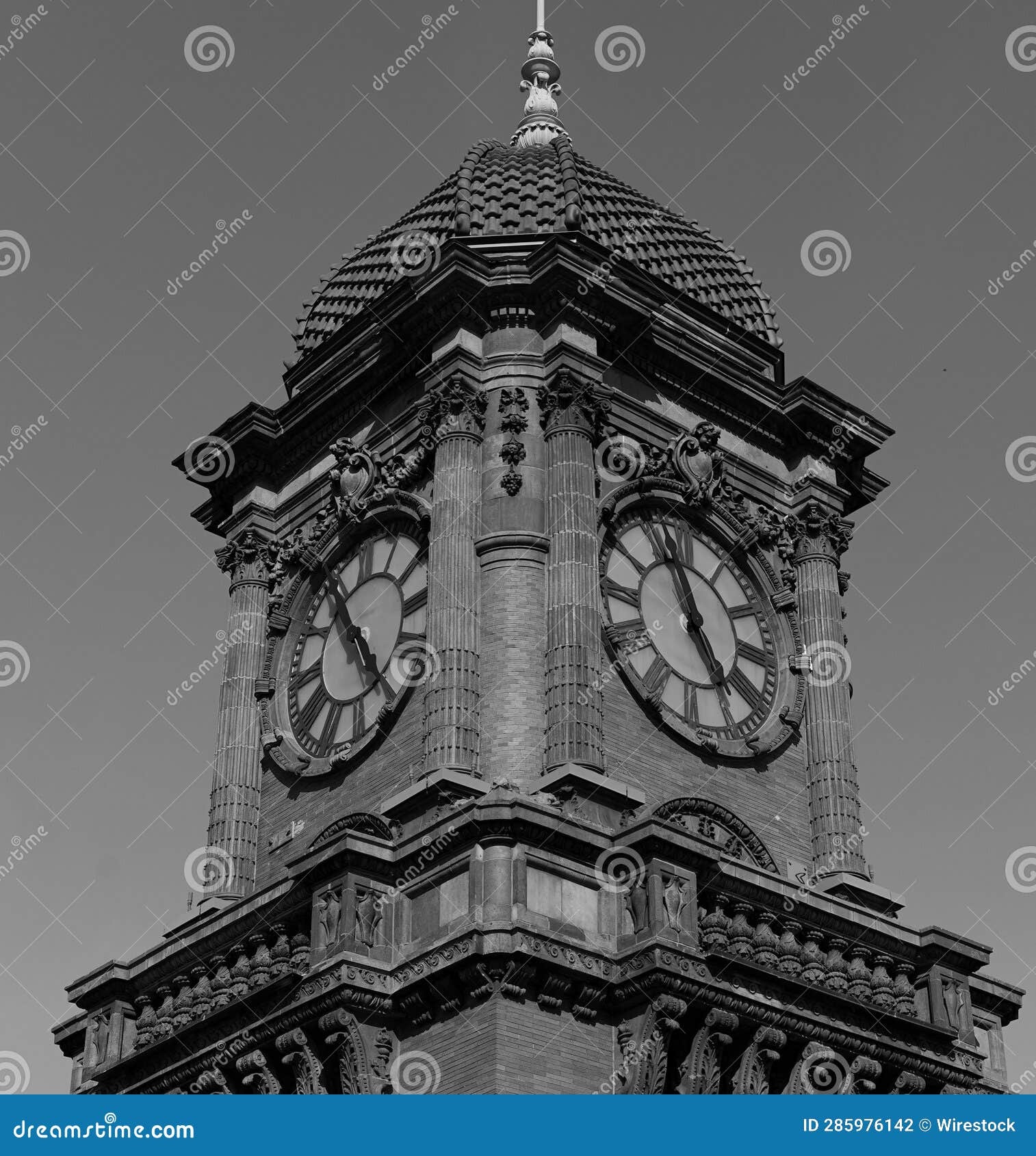 Tall Clock Tower Featuring Two Clocks on Either Side of Its Facade ...