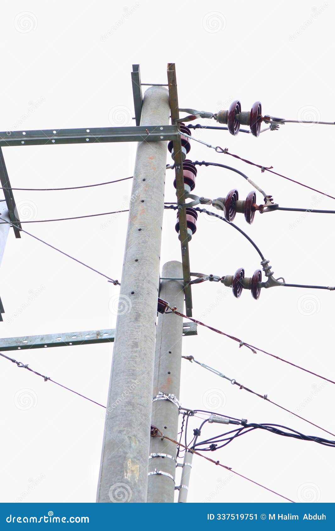 The Electrical Pole is Made of Concrete and Supports Many Wires. Stock ...