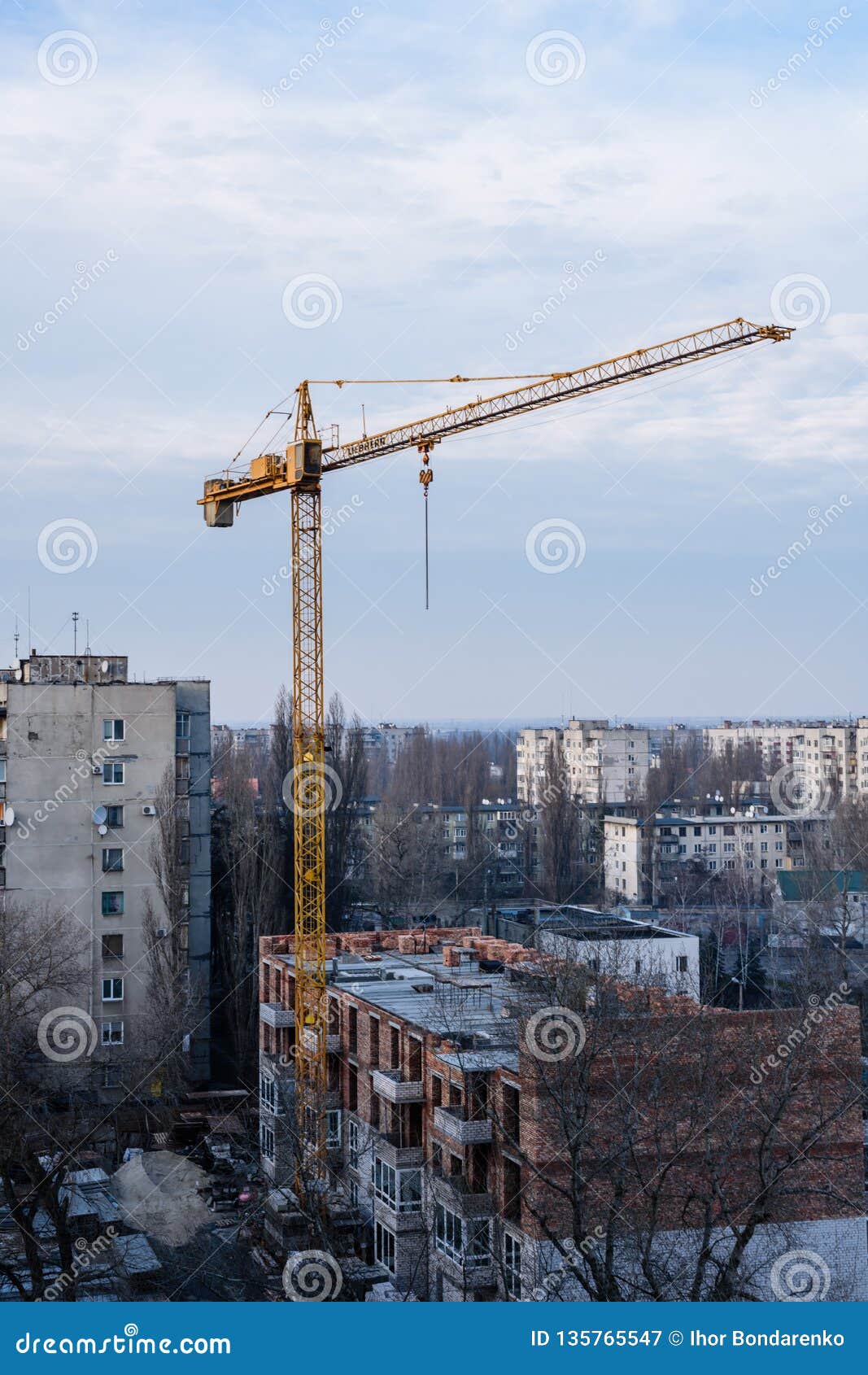 Tall Construction Crane at a Building Site Stock Image - Image of high ...