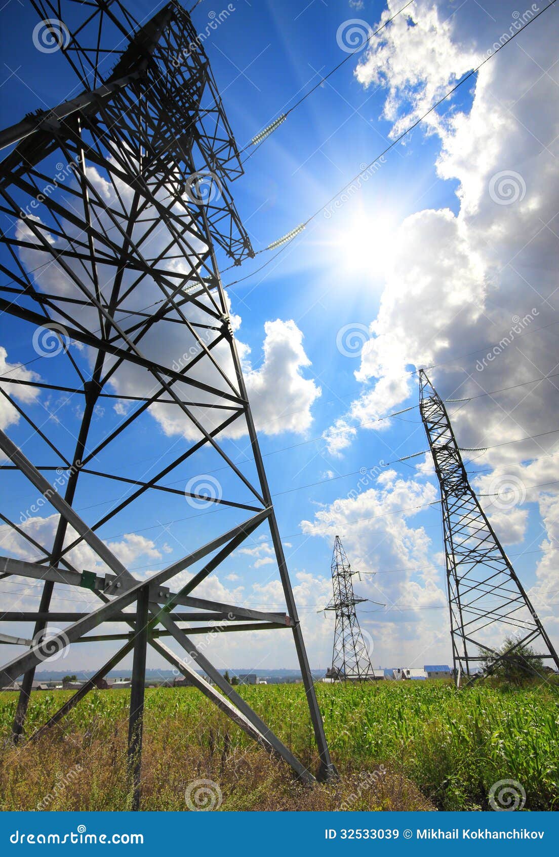 Tall Electric Masts Against Sun and Sky Stock Image - Image of mast ...