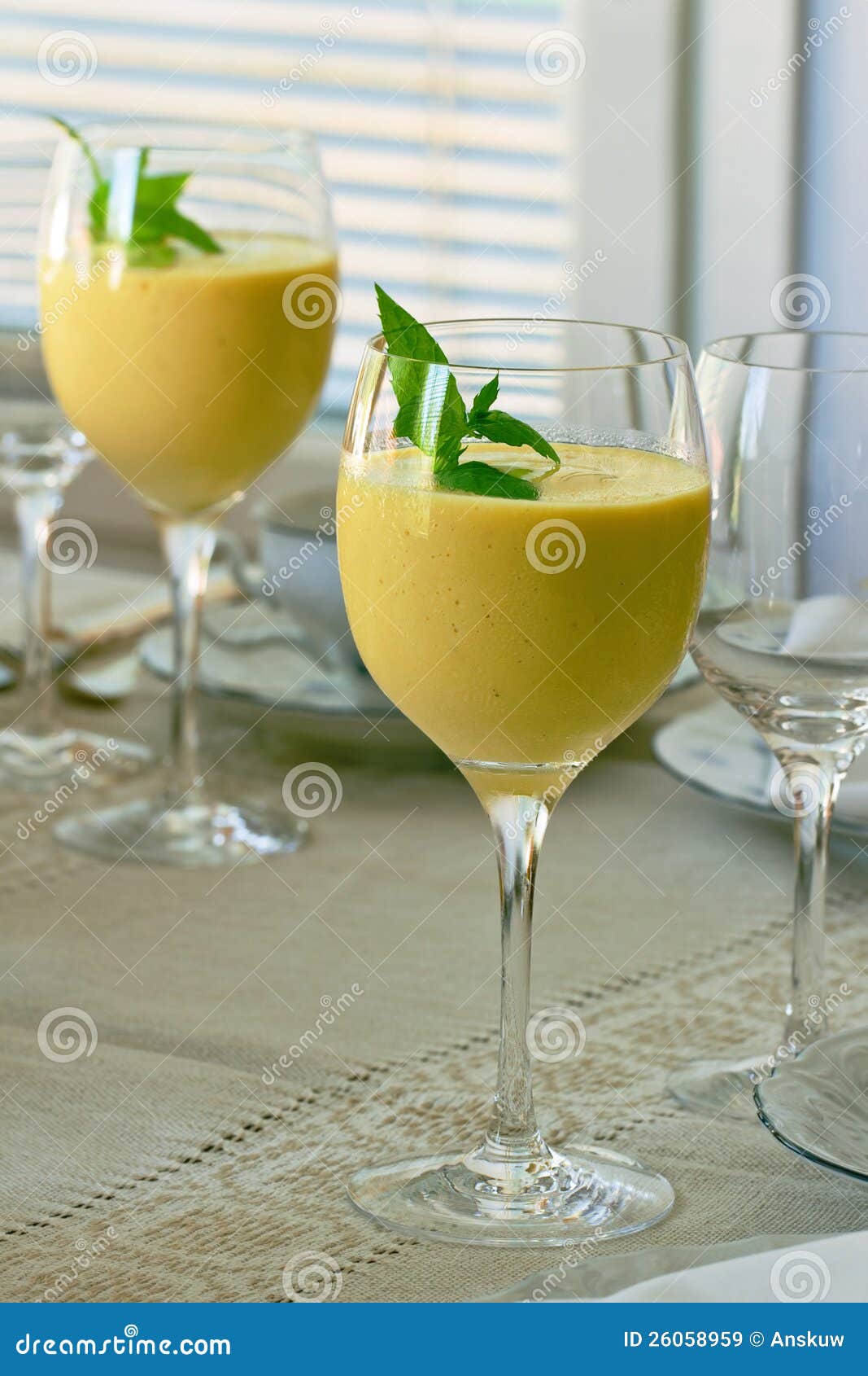 Tall Glasses of Mango Smoothie Stock Image - Image of setting, dessert ...