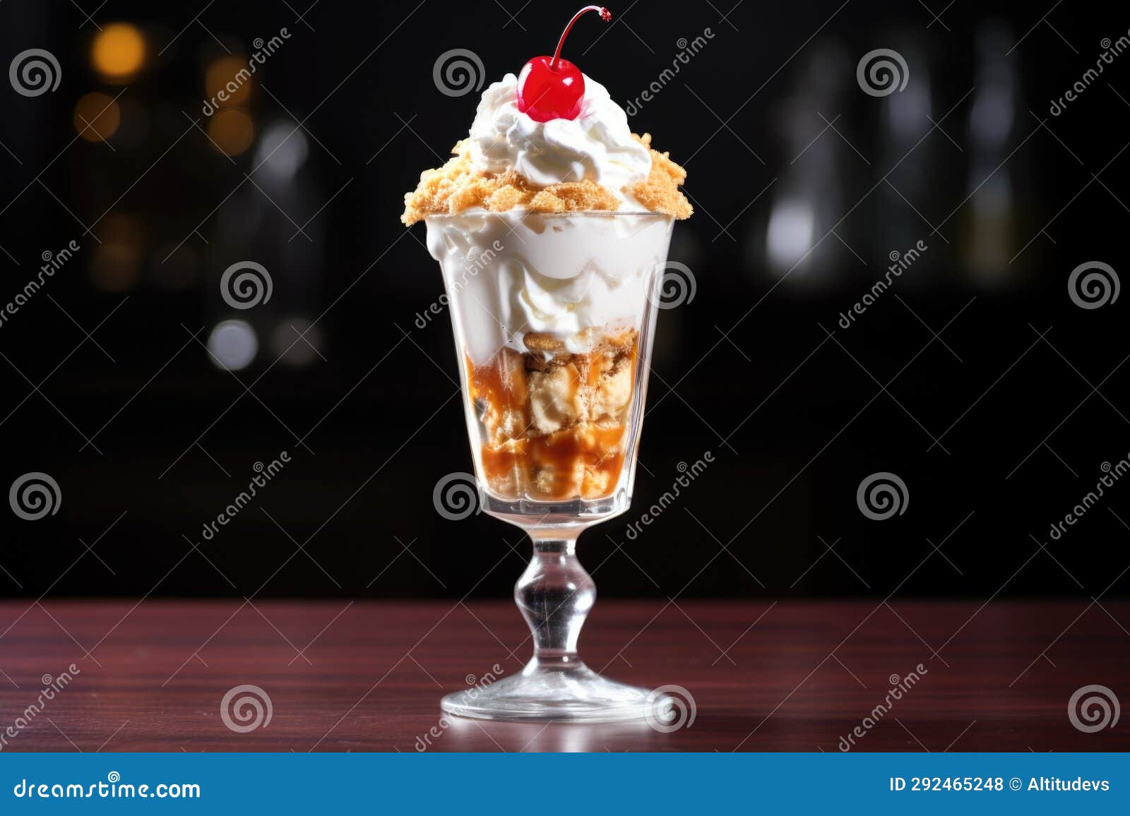 A Tall Ice Cream Sundae with Whipped Cream and a Cherry Stock Photo ...