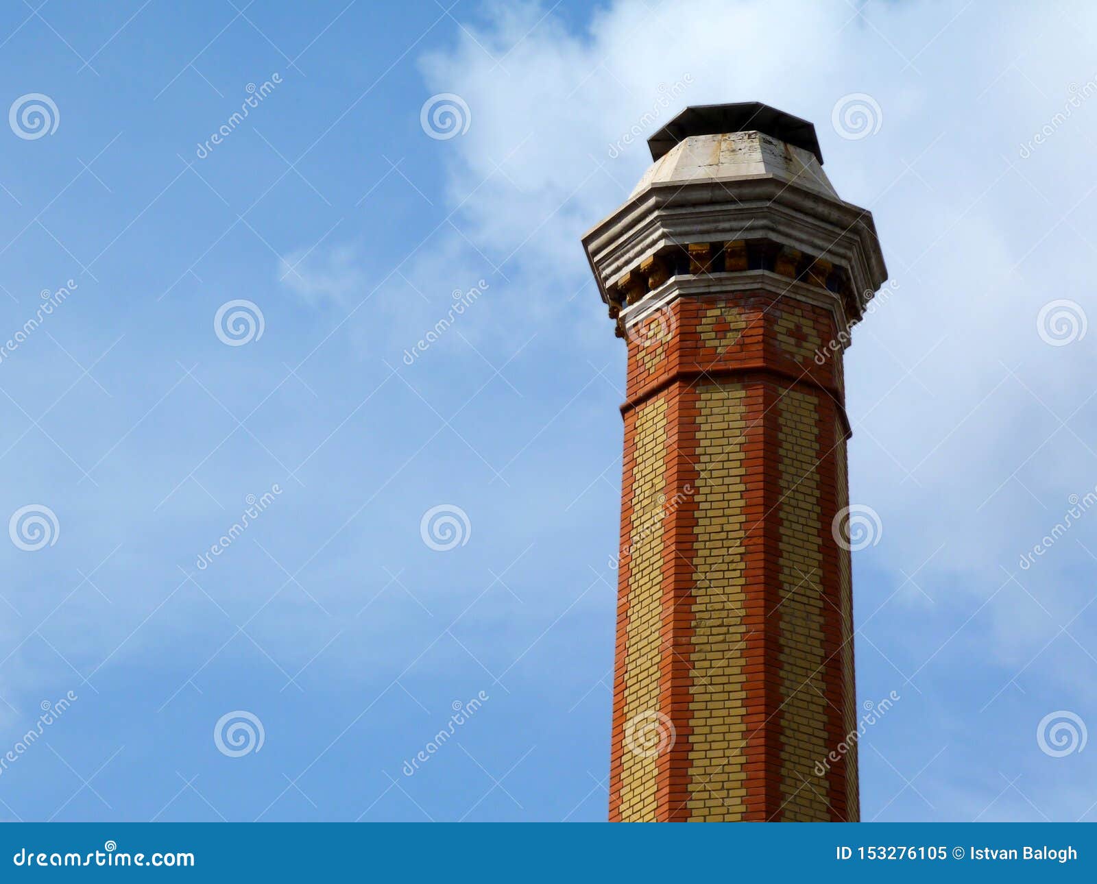 Tall Industrial Chimney Stack Of Yellow And Red Brick Of Octagonal Base ...
