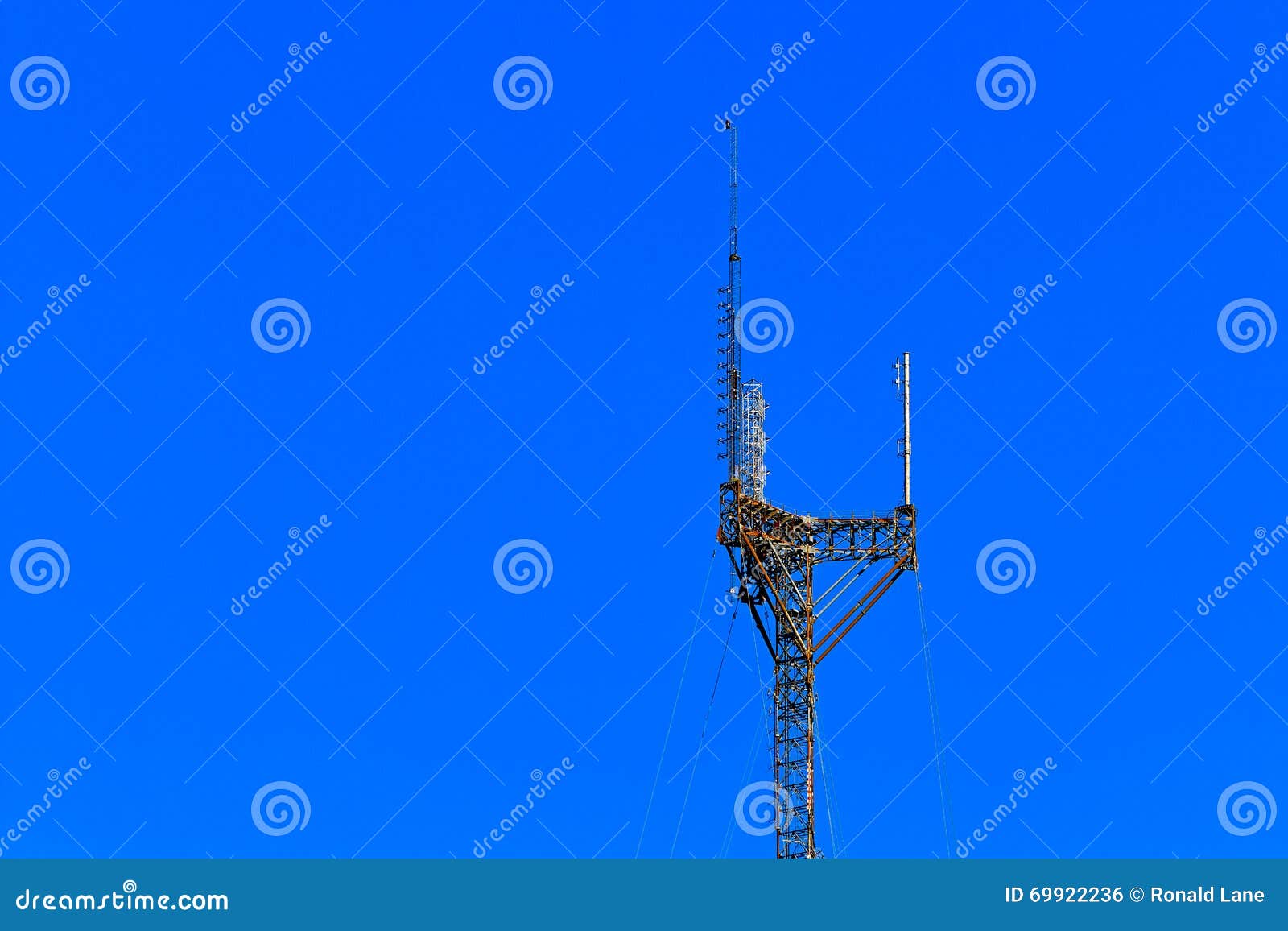 Tall, Large, Cell Phone Tower Against a Blue Sky Stock Photo - Image of ...