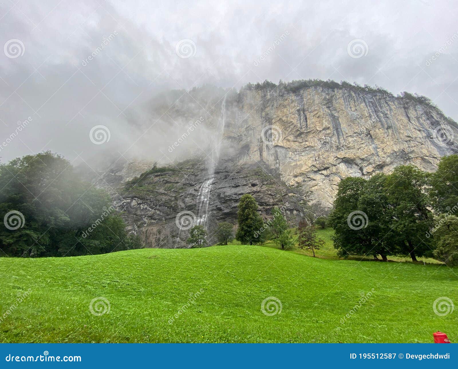 Giant Waterfall from the Clouds Stock Image - Image of rose, pastures ...