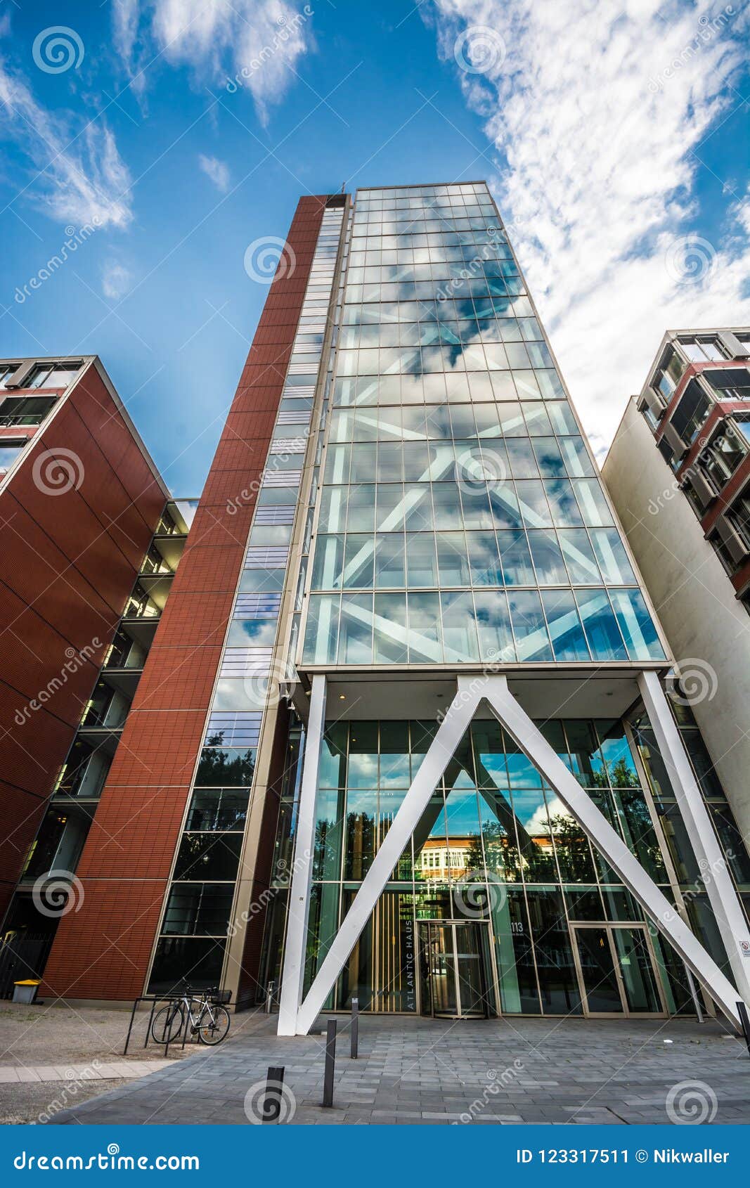 Tall Modern Building with Clouds Reflections in the Windows. Hamburg ...