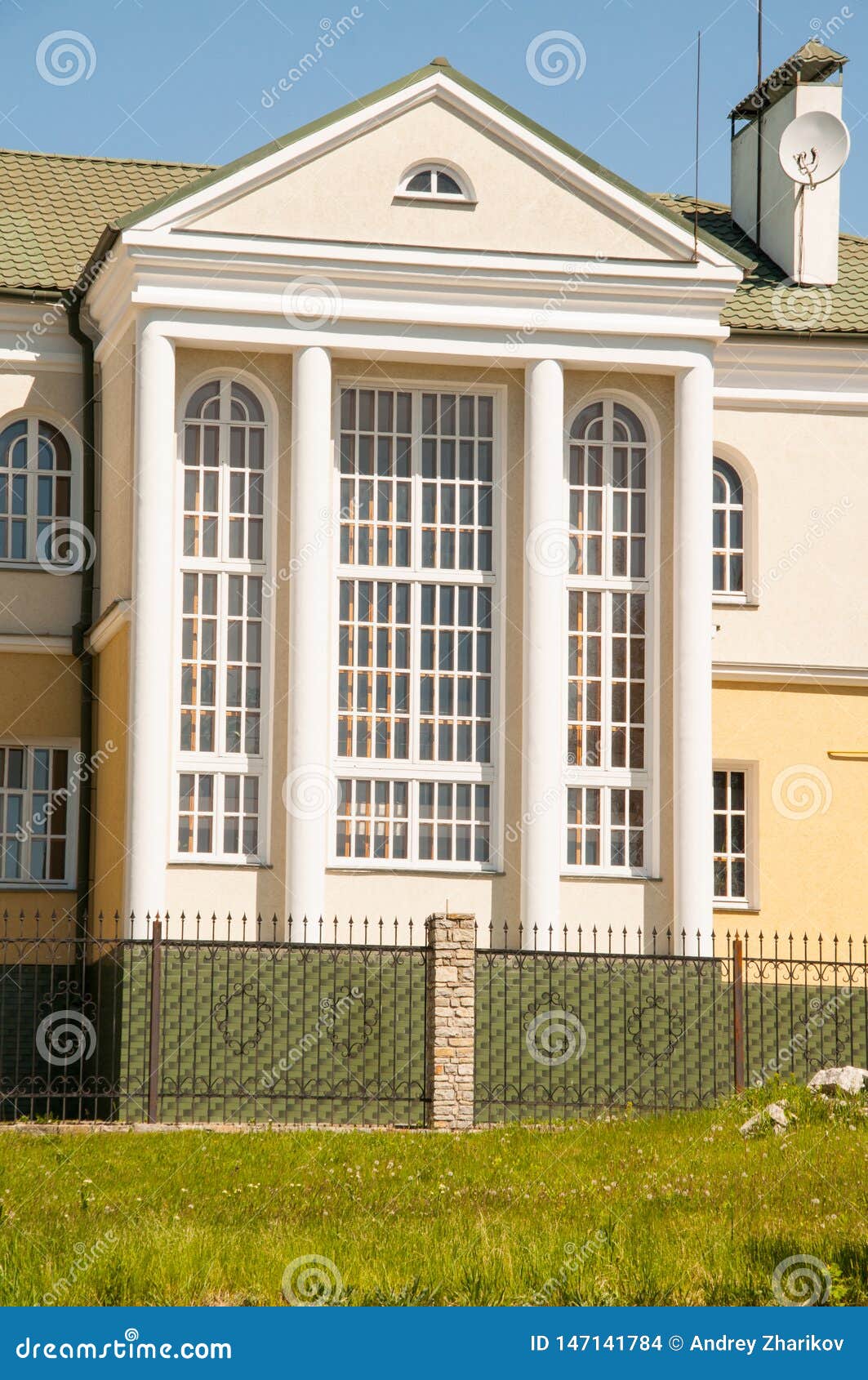Tall Modern Building with Large Pillars Stock Photo - Image of ...