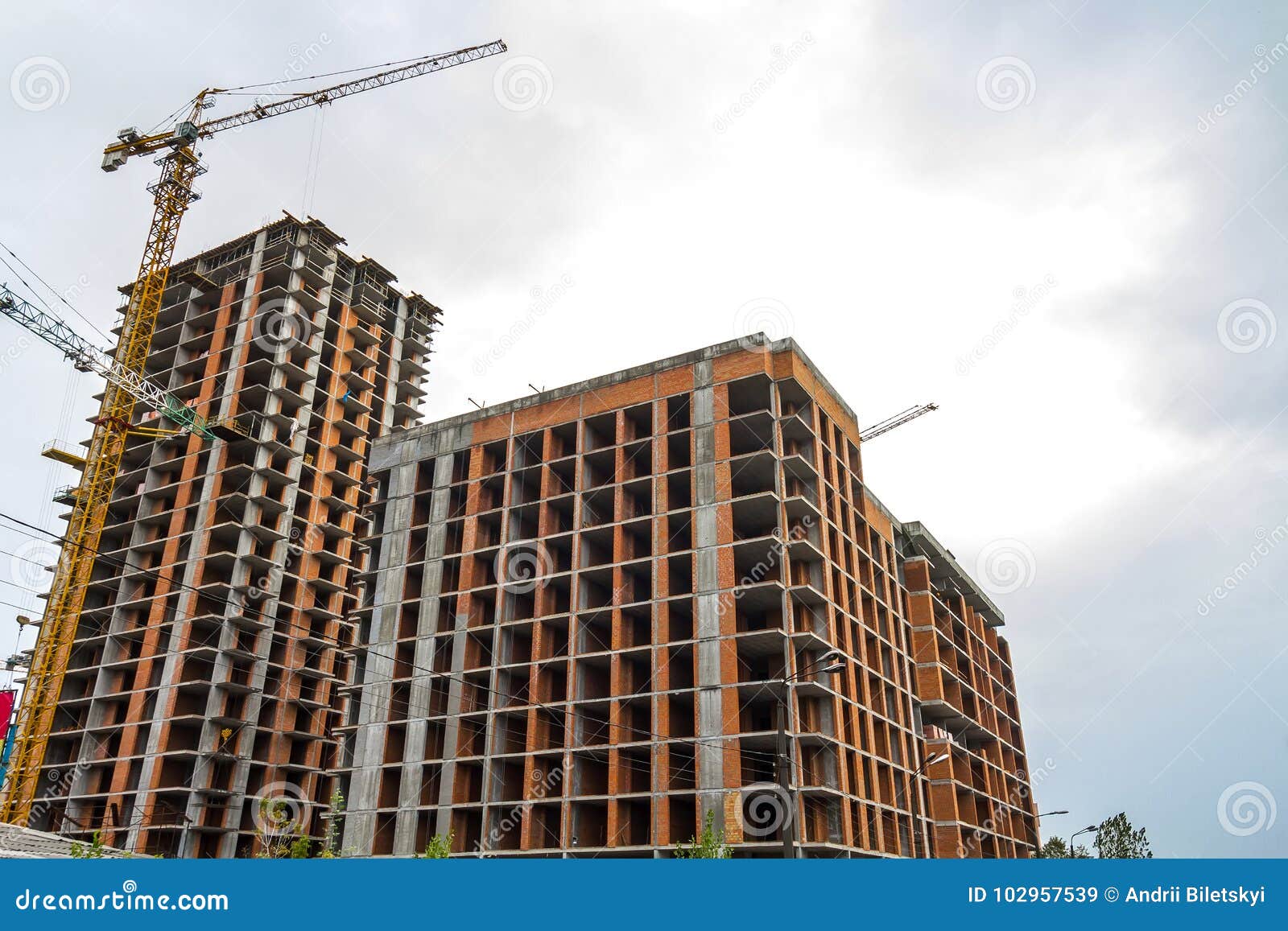 Tall Modern Concrete Apartment Building Under Construction with Stock ...