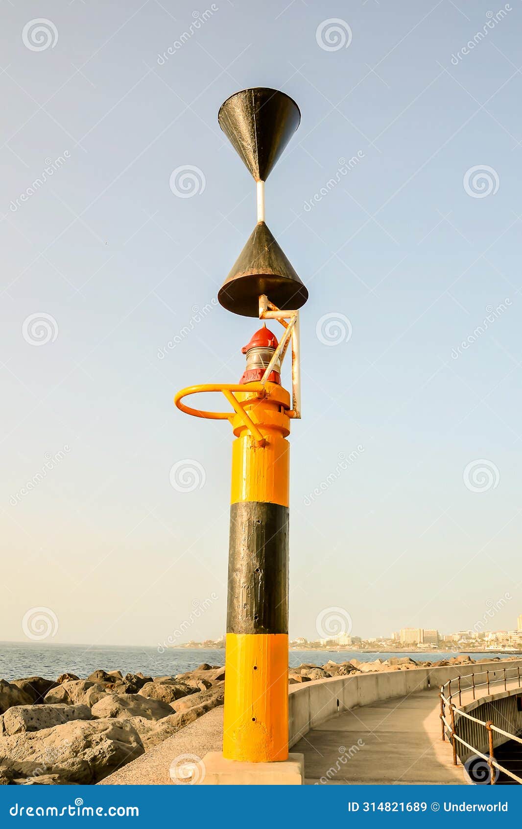 A Tall Pole with a Red and White Fire Hydrant on Top Stock Image ...