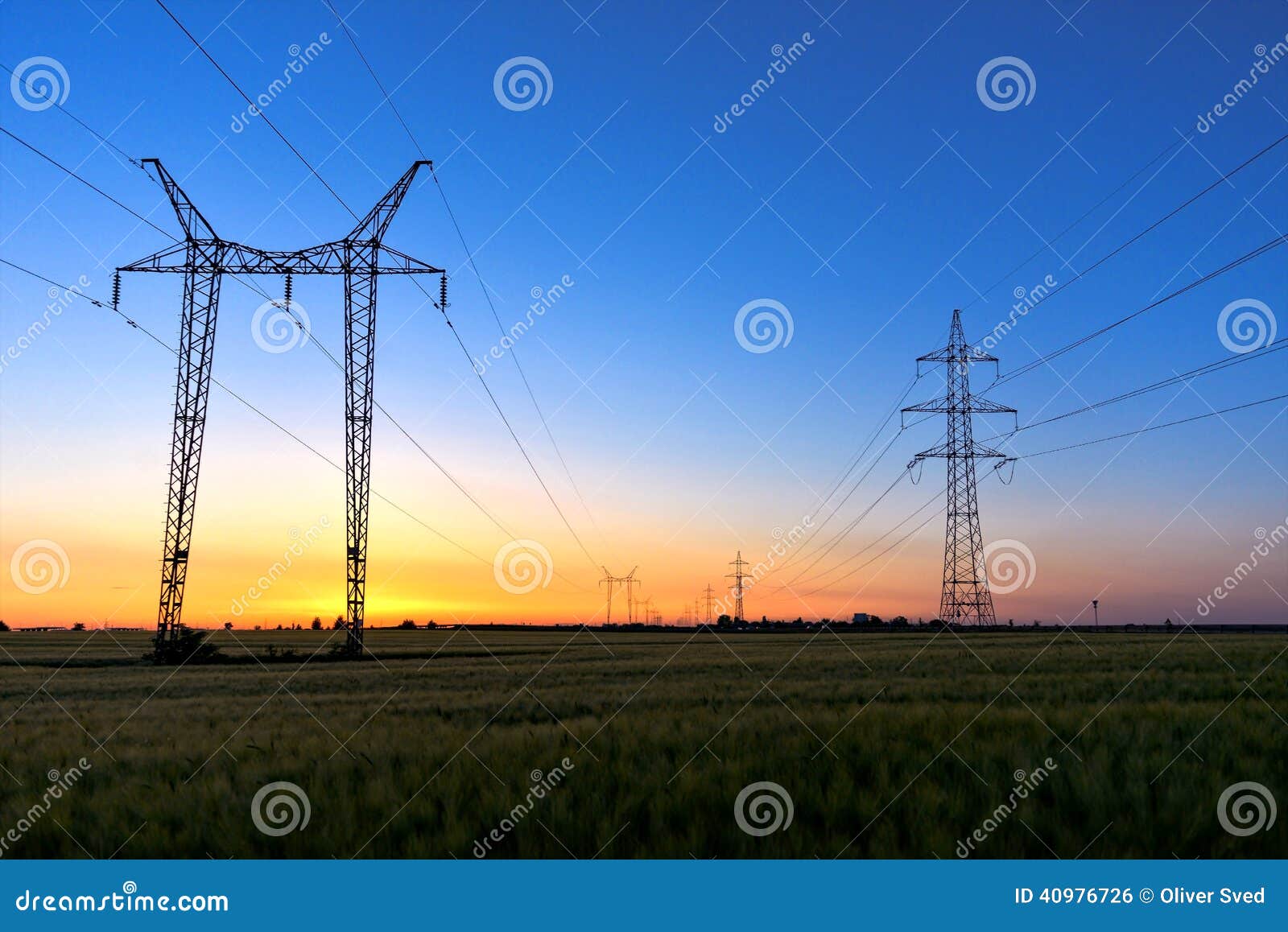 Tall power lines at dusk stock photo. Image of electrical - 40976726