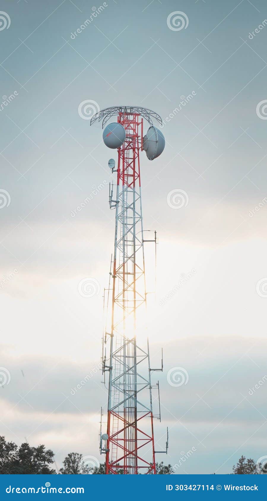 Tall Radio Tower with the Sun Setting in the Background Stock Photo ...