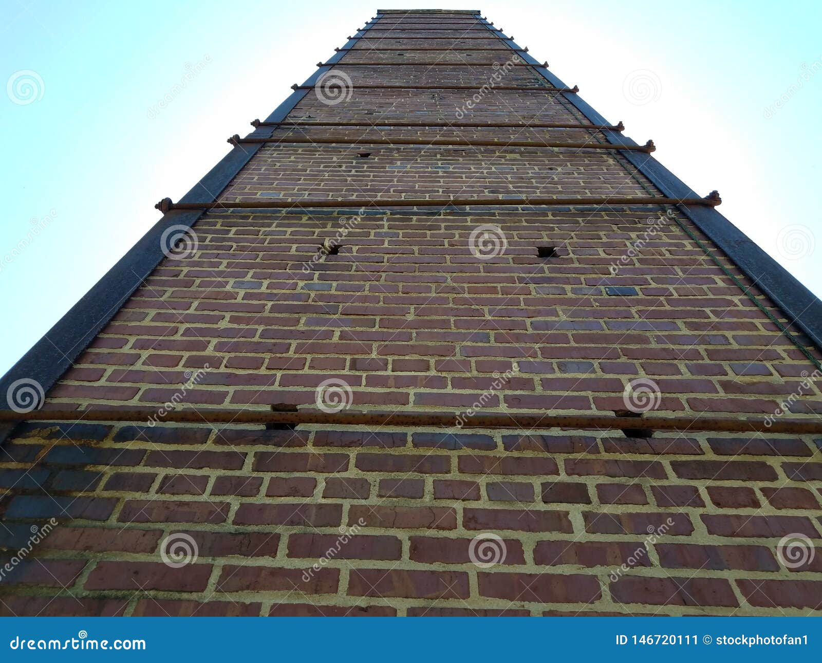 Tall Red Brick Chimney or Masonry with Metal Support Stock Image ...