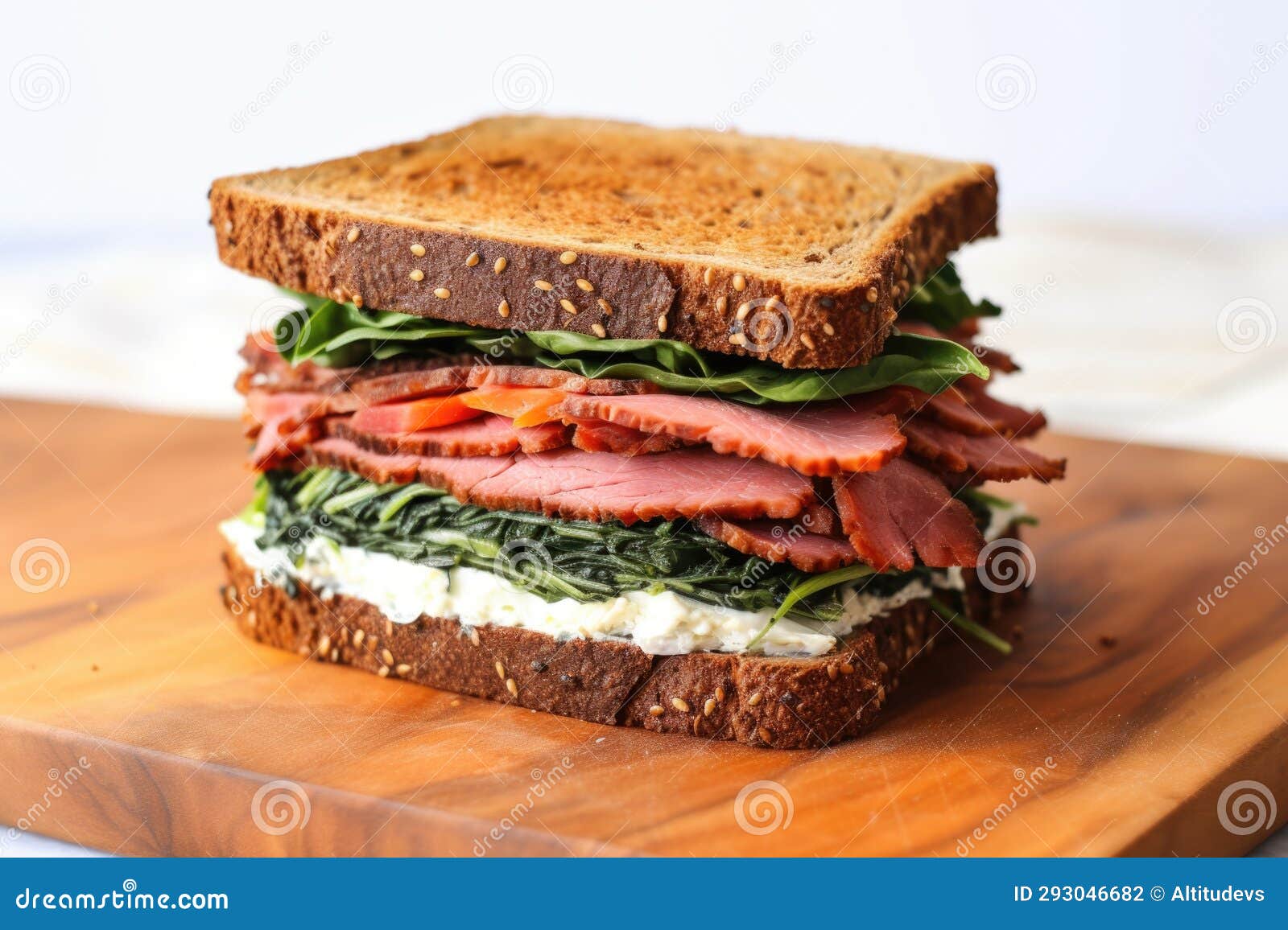 A Tall Roast Beef Sandwich on Rye Bread, on a Rectangular Board Stock ...
