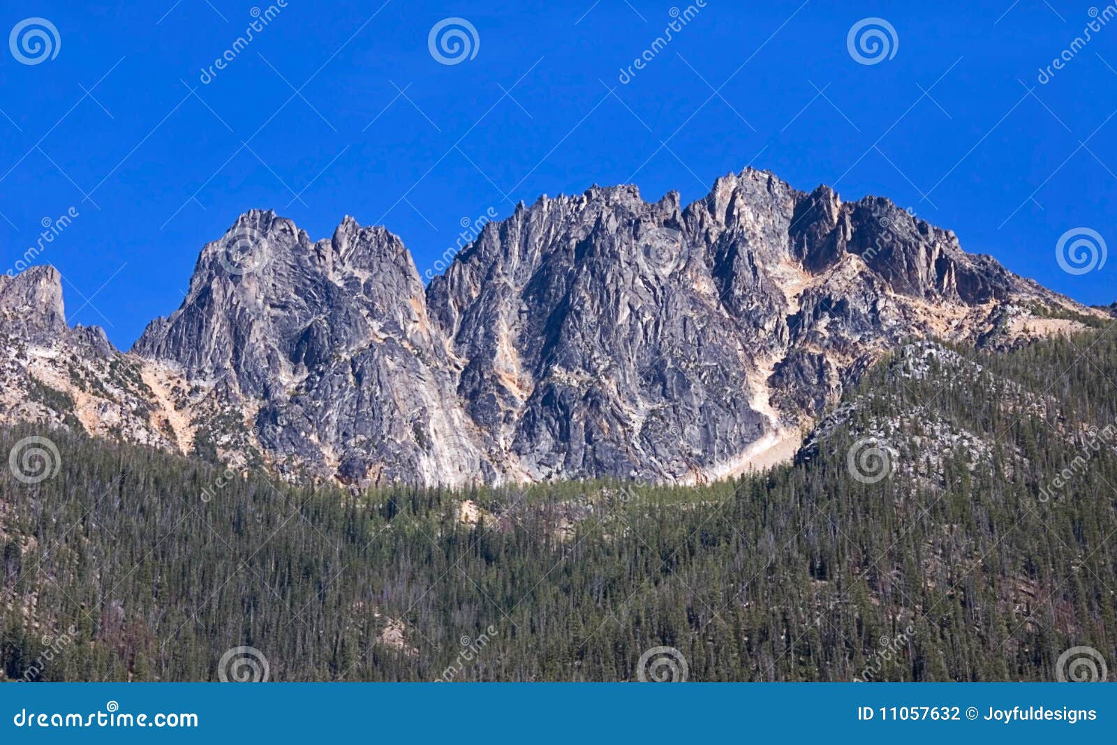 Tall Rugged Mountain stock photo. Image of daylight, woods - 11057632