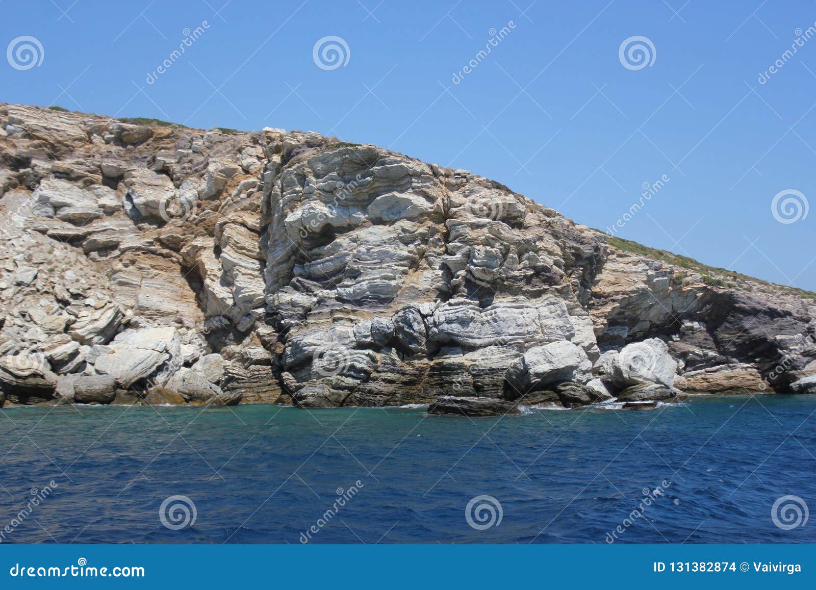 Tall Sharp Cliff Shooted from the Water Stock Photo - Image of geology ...