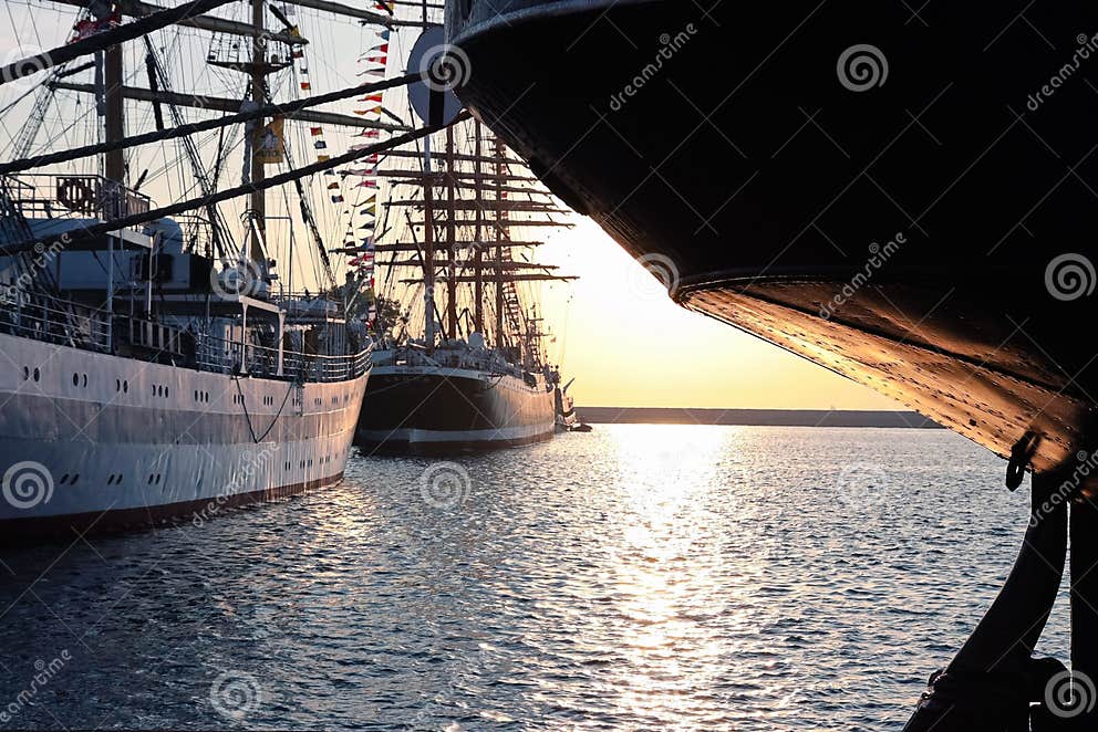Tall ships on sunset editorial photography. Image of event - 21118412