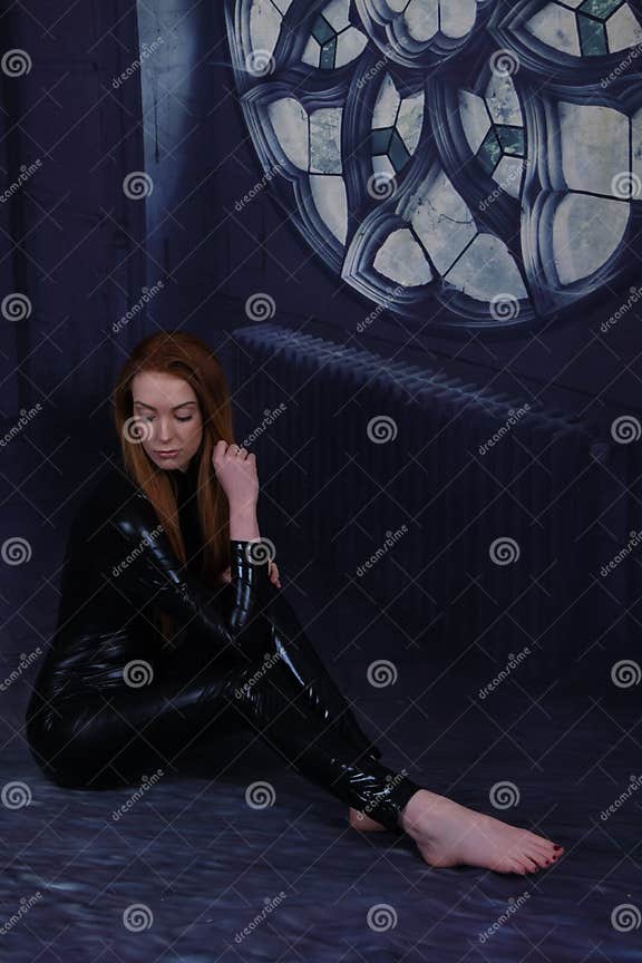 Tall Slim Attractive Redhead Model Dressed In Tight Pvc Fetish