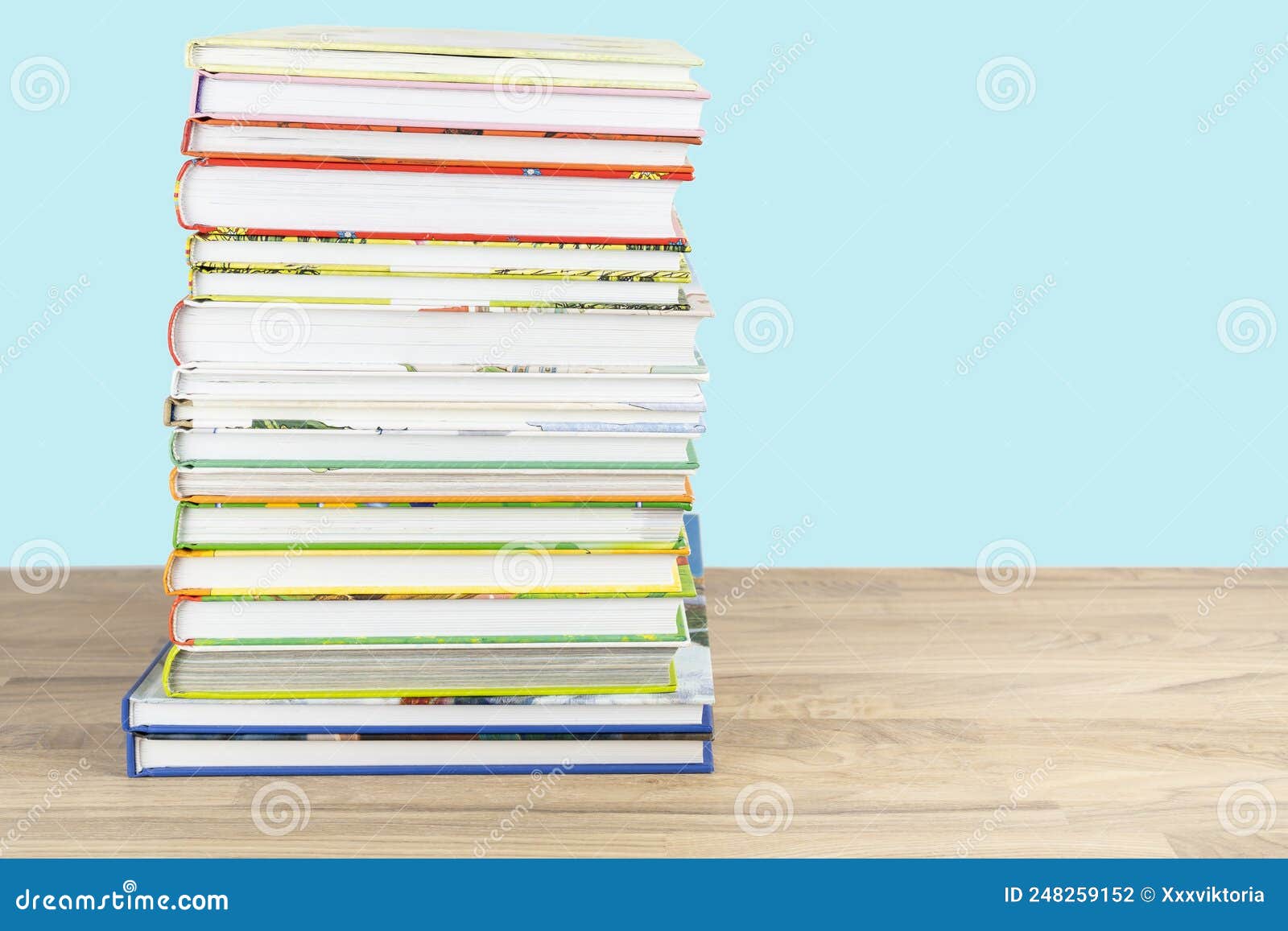 Tall Stack of Children Colourful Books on the Table Stock Photo - Image ...