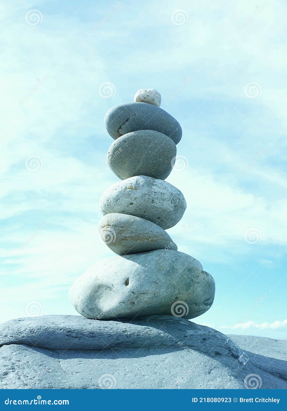 Tall Stack Pile of Balanced Stones Rocks Against Blue Sky Stock Image ...