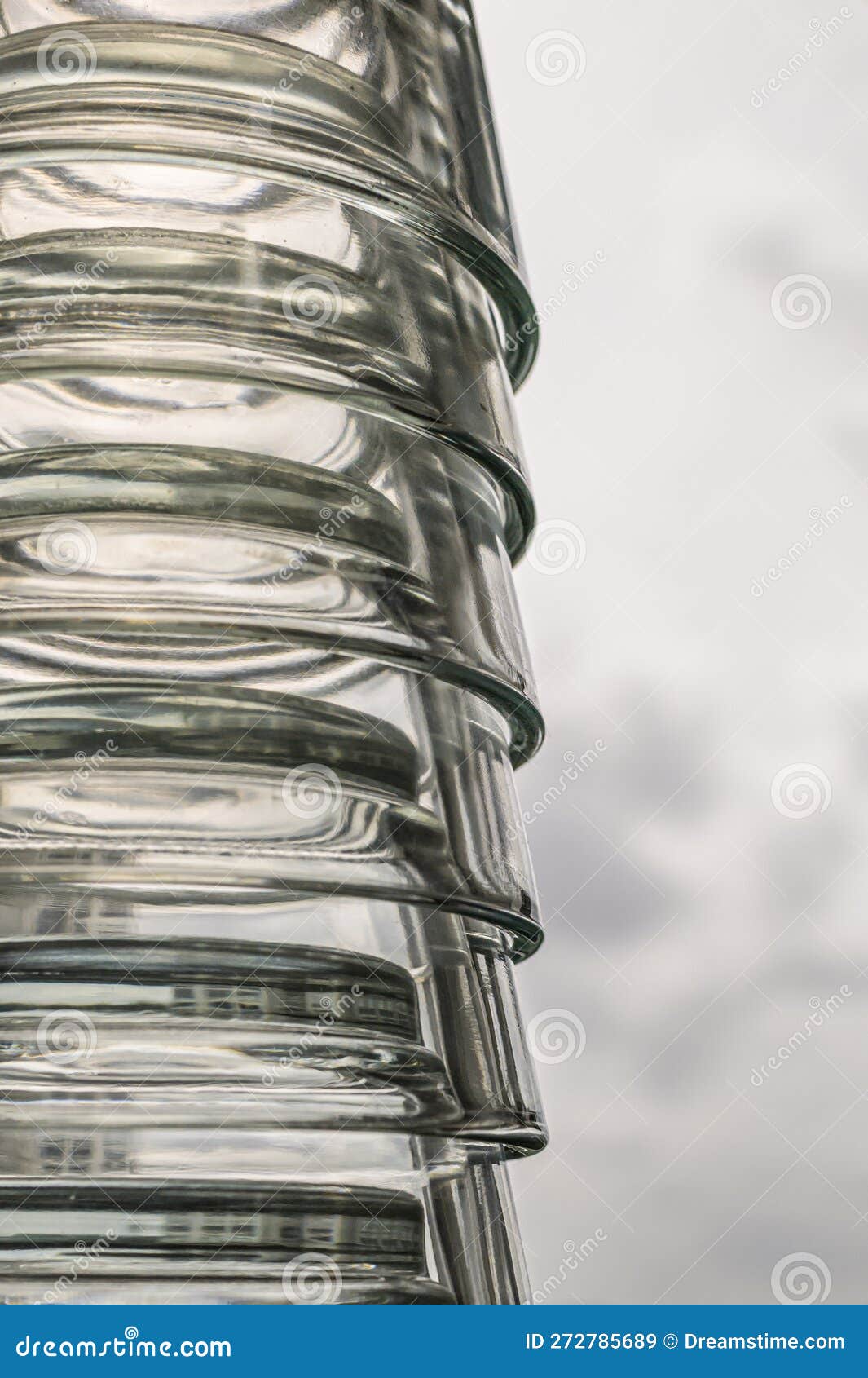 A Tall Stack of Small Glass Cups by the Window. Stock Image - Image of ...