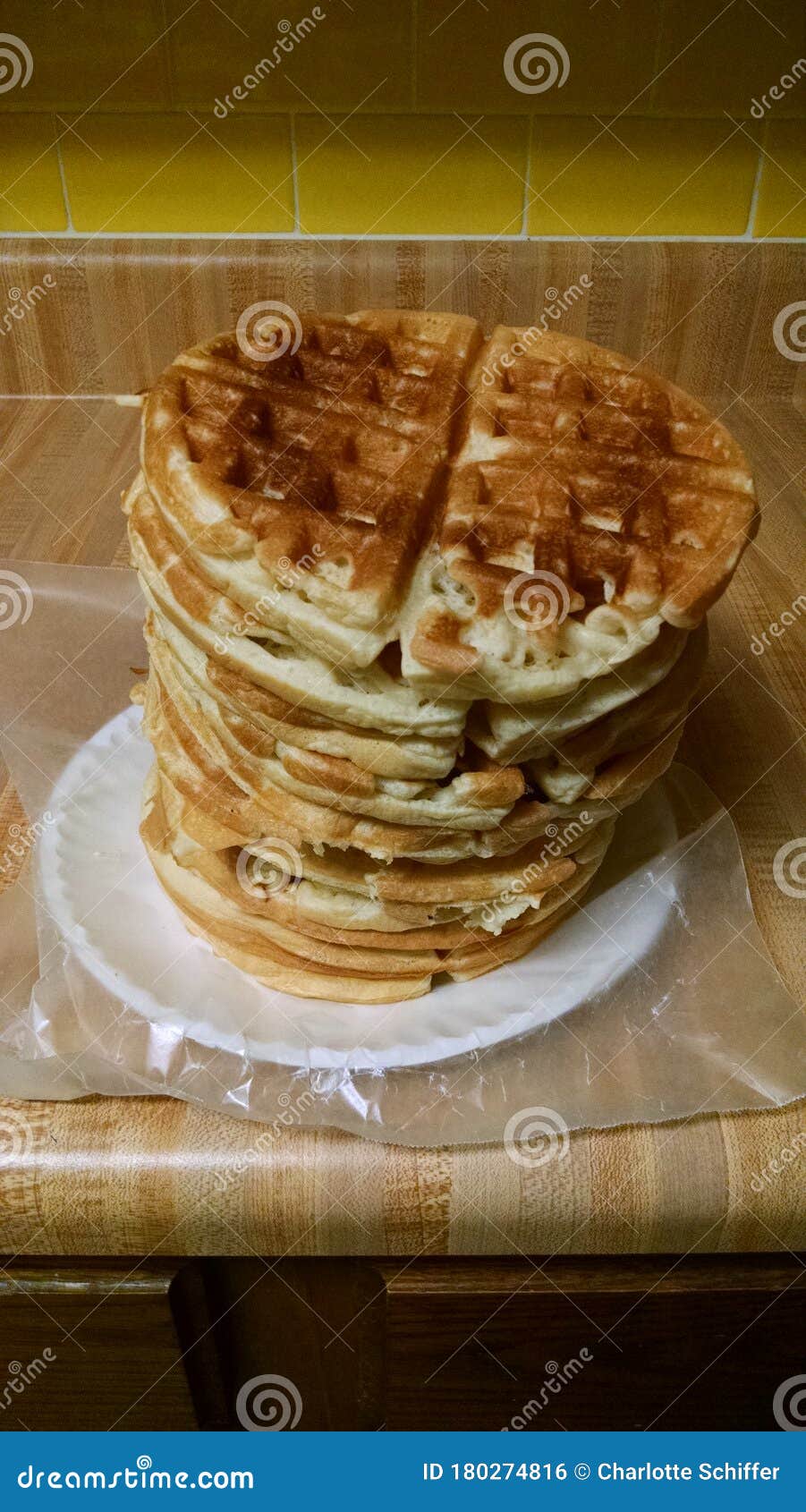 Tall stack of waffles stock photo. Image of paper, food - 180274816