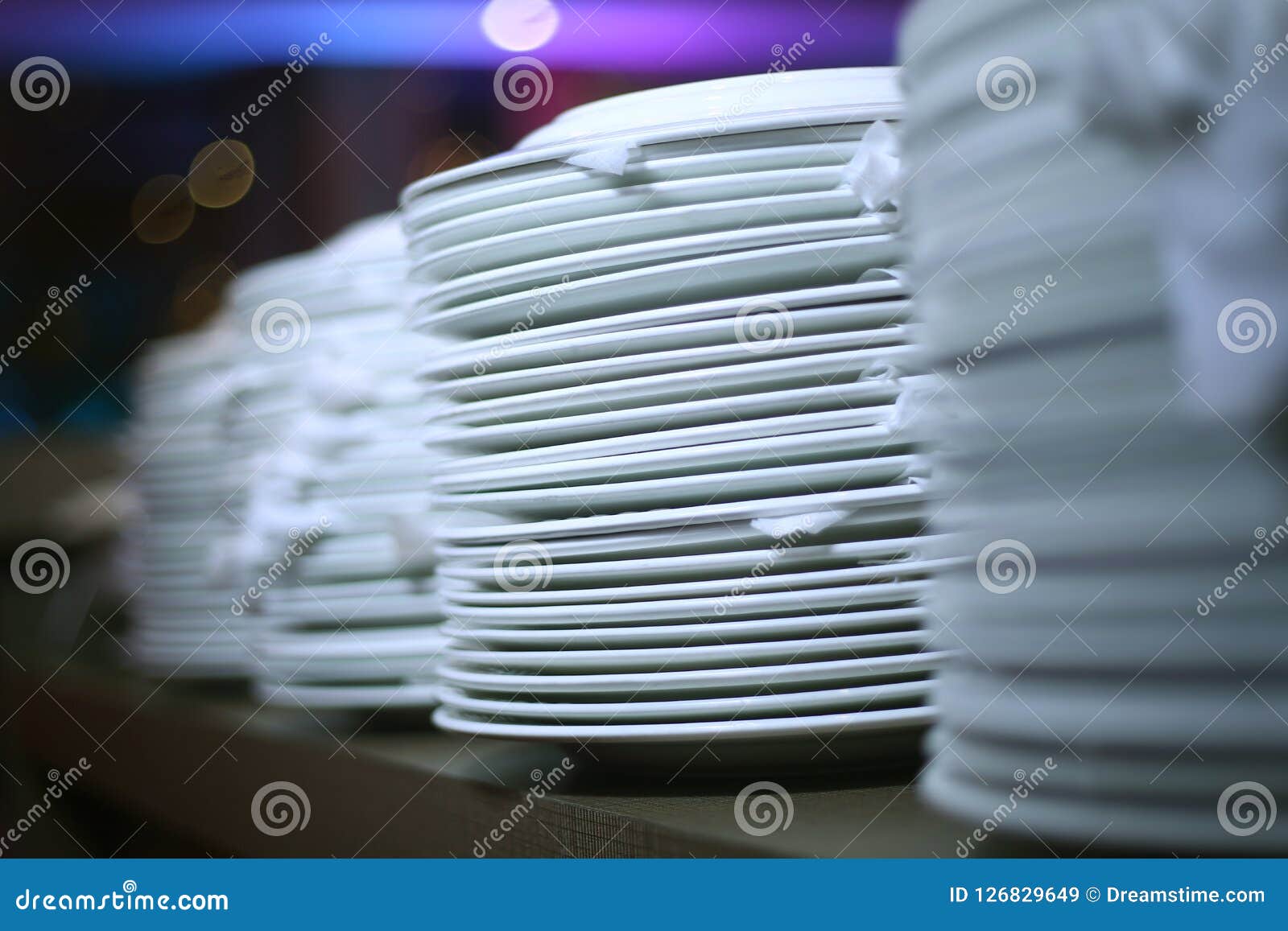 Tall Stack of White Plates on a Table. Stock Image - Image of dish ...