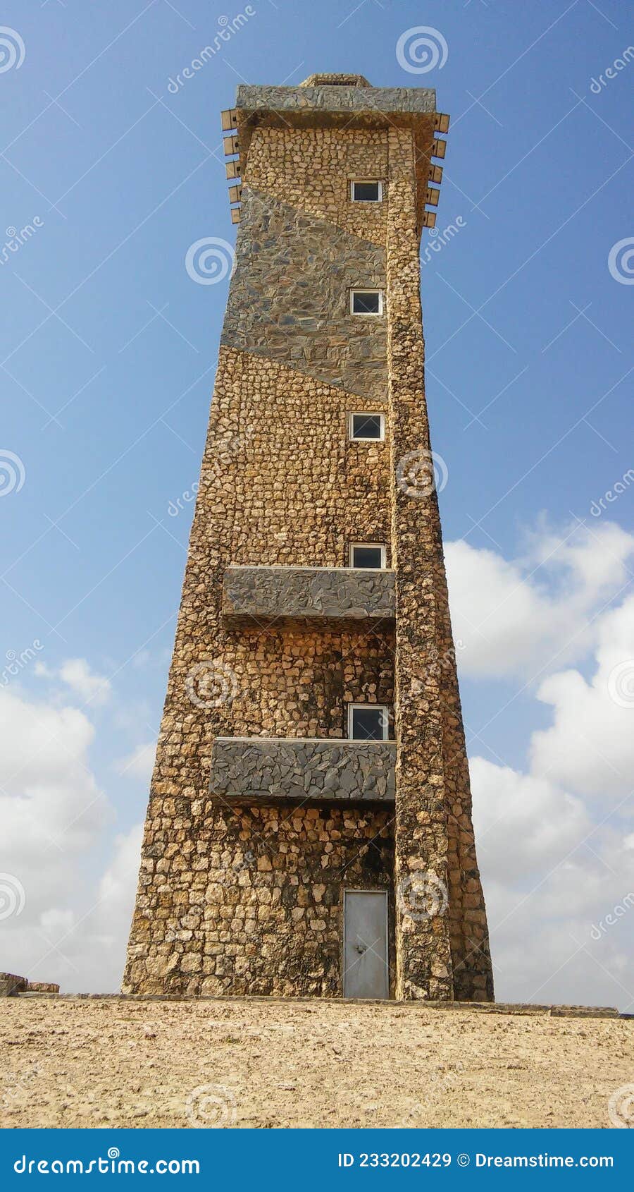 A tall tower stock image. Image of temple, statue, facade - 233202429