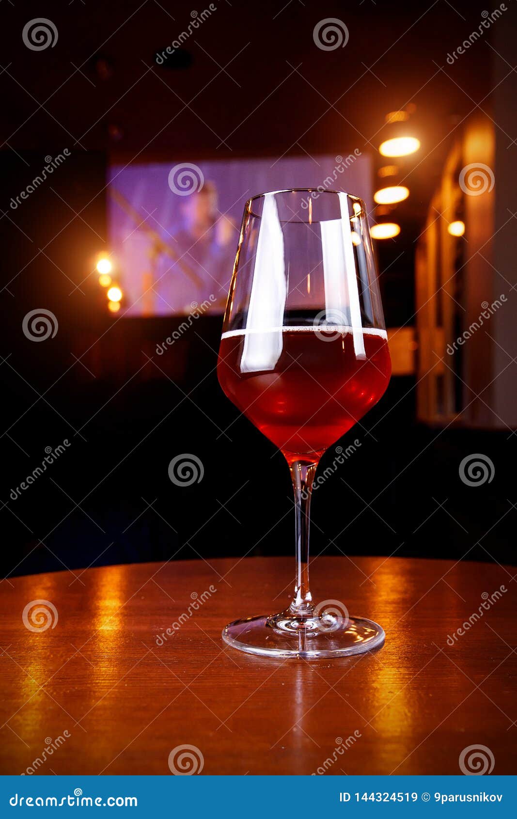 Tall Tulip Glass Full in the Bar Stock Image - Image of sampler, wheat ...
