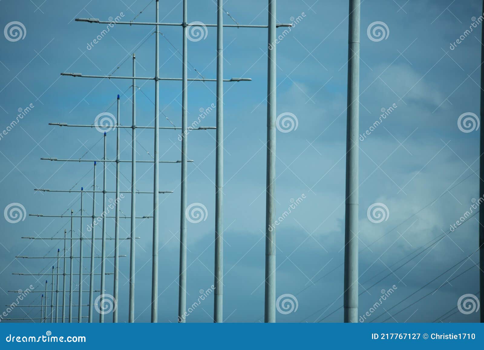 Tall Urban Light Towers in a Row Stock Image - Image of lined, highway ...