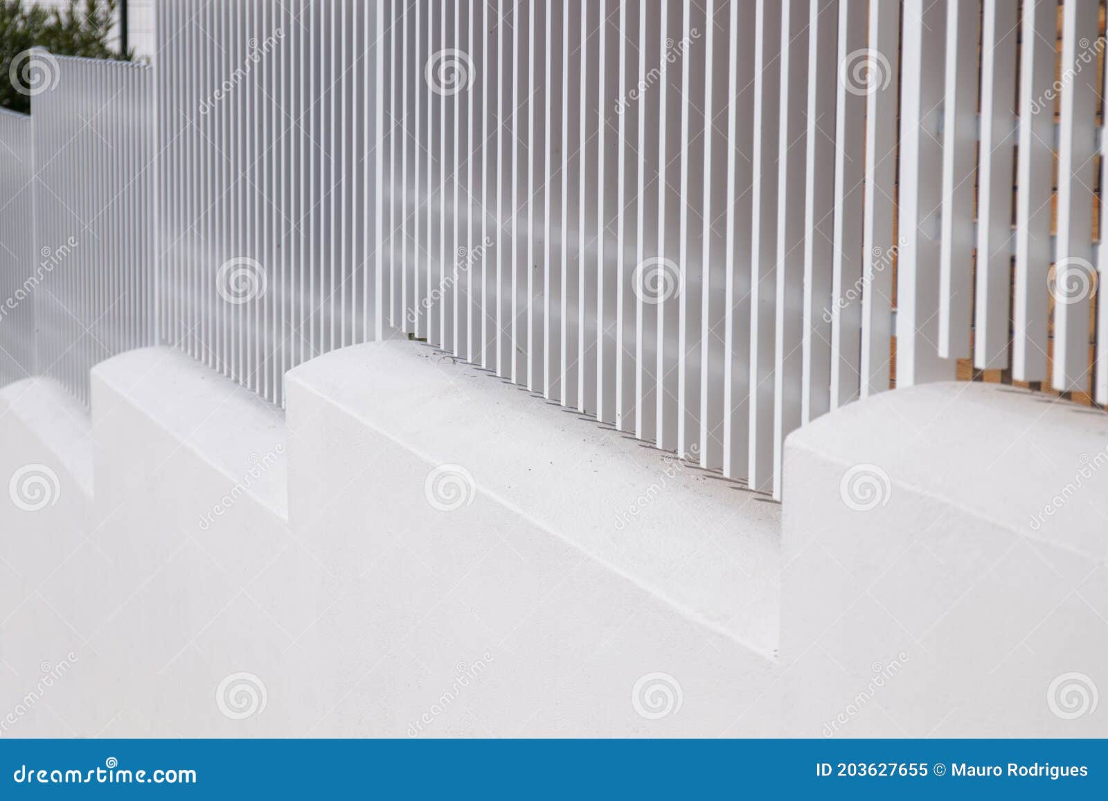 Tall Wall with White Iron Fence Stock Image - Image of architecture ...