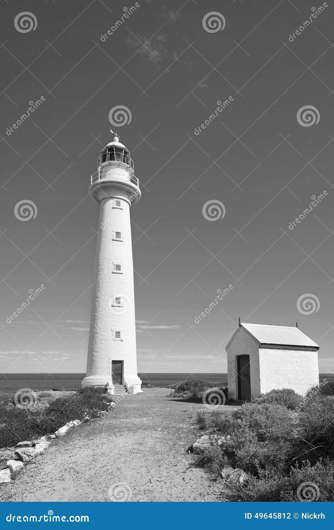 Tall White Lighthouse stock photo. Image of lowly, outdoor - 49645812