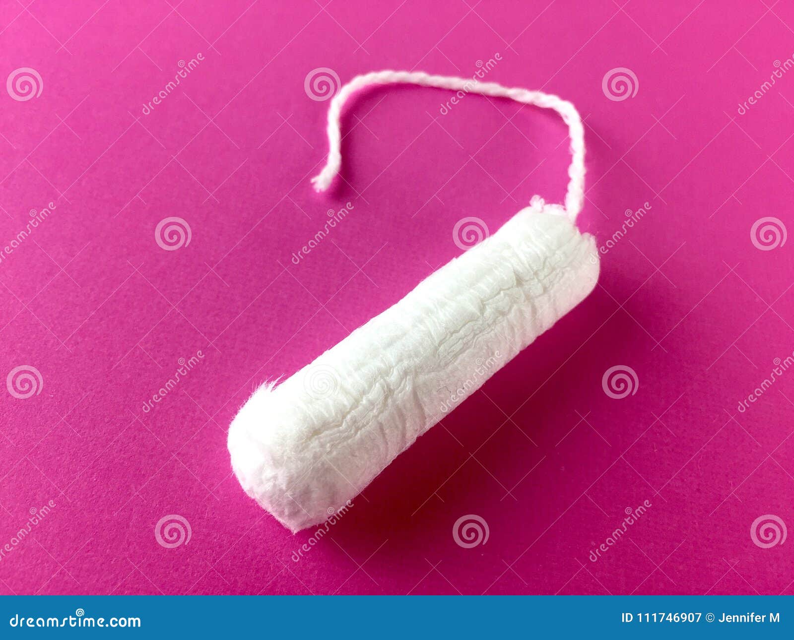 Tampon on a pink surface stock image. Image of menses - 111746907